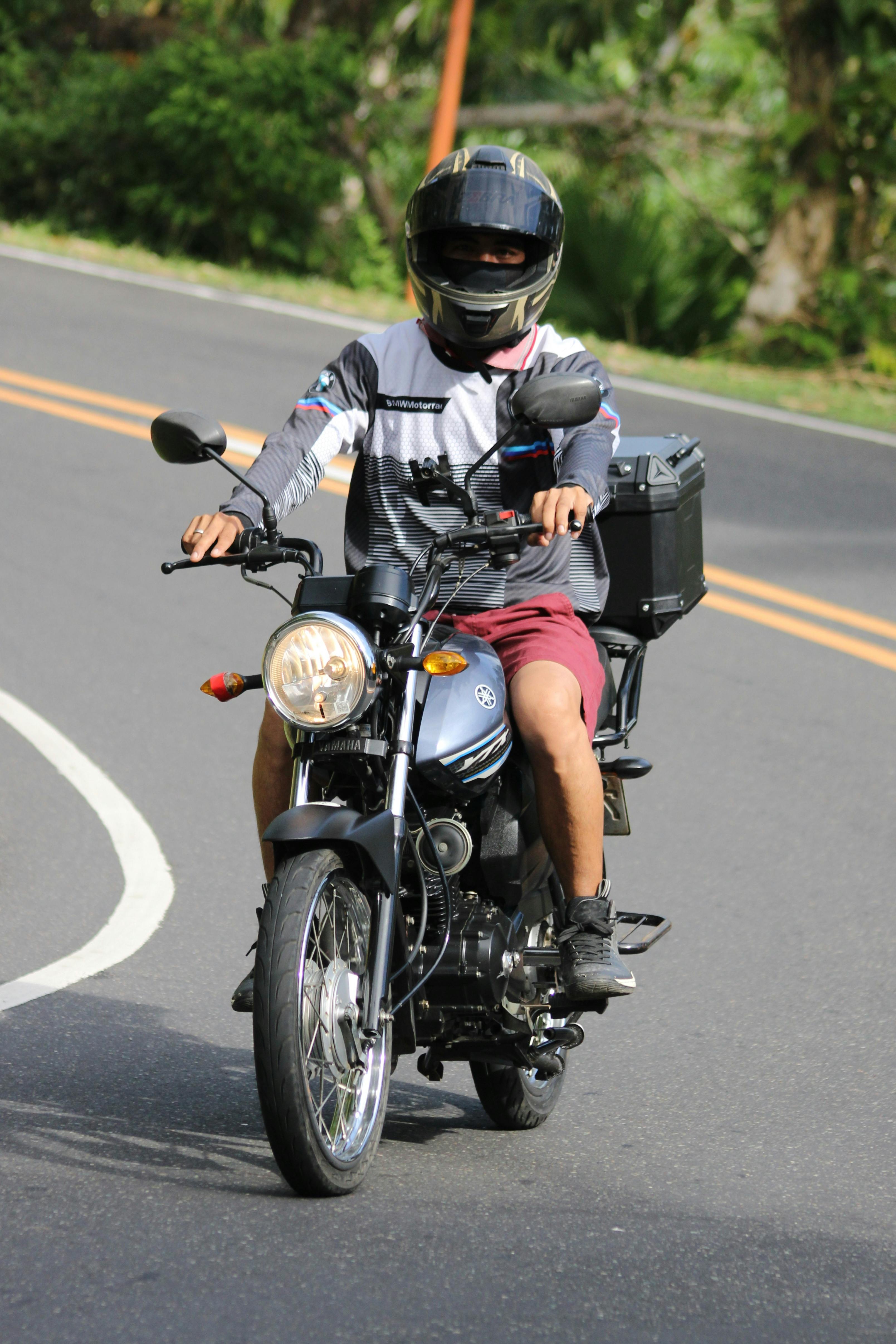 Person Riding Motorcycle during Golden Hour · Free Stock Photo