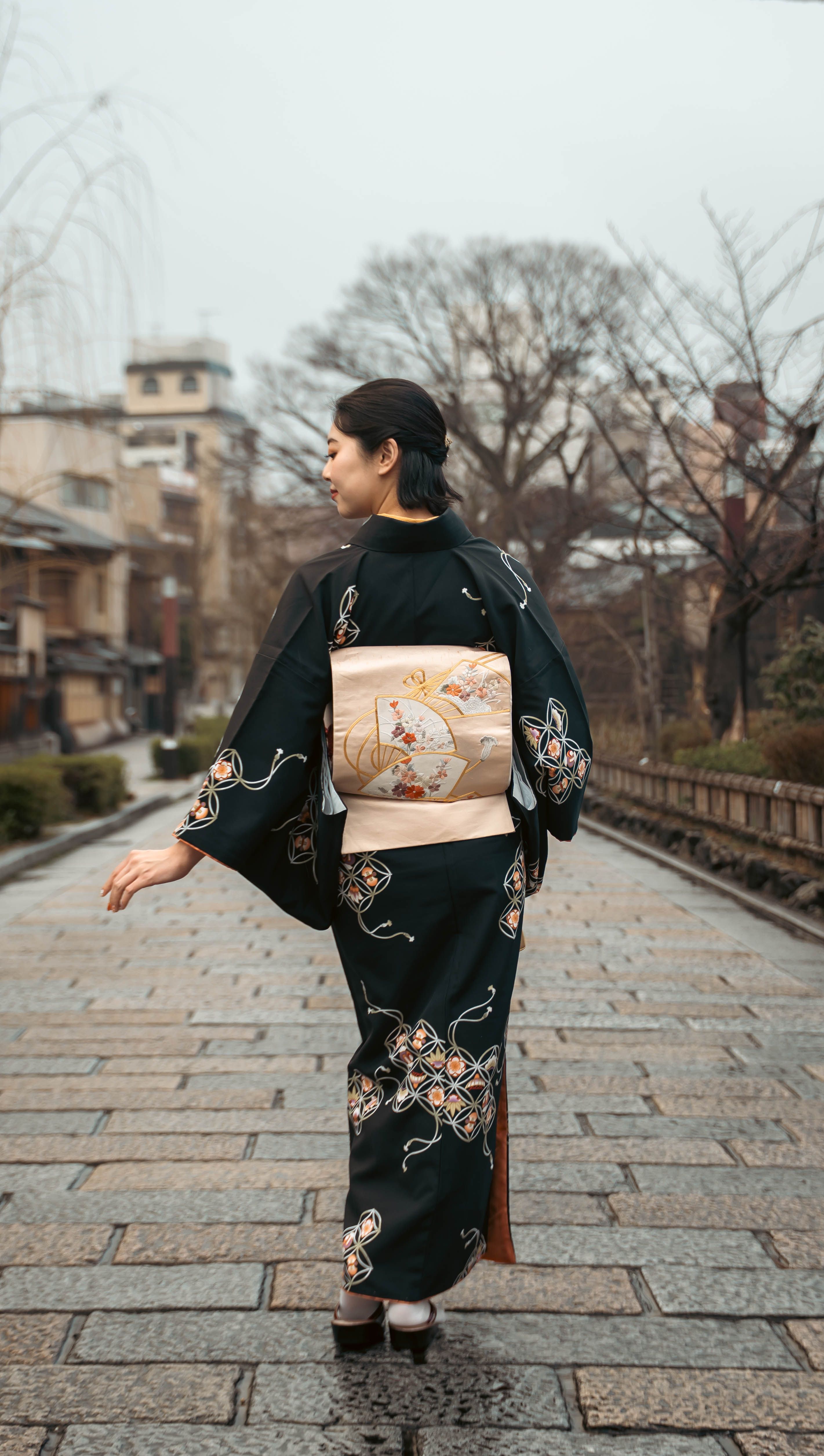 Woman Walking in Traditional Kimono on Kyoto Street · Free Stock Photo