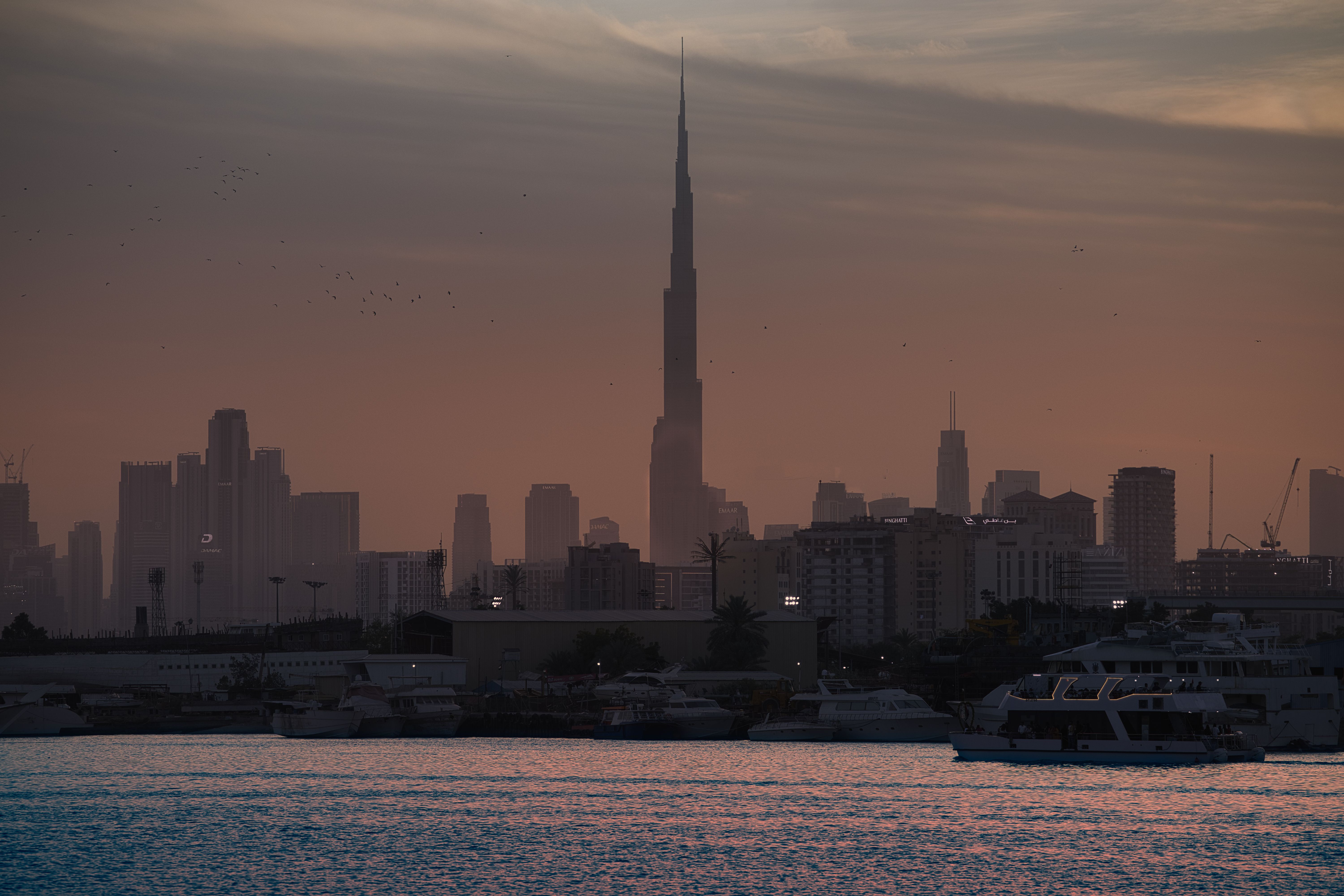 Stunning Dubai Skyline with Burj Khalifa at Sunset · Free Stock Photo