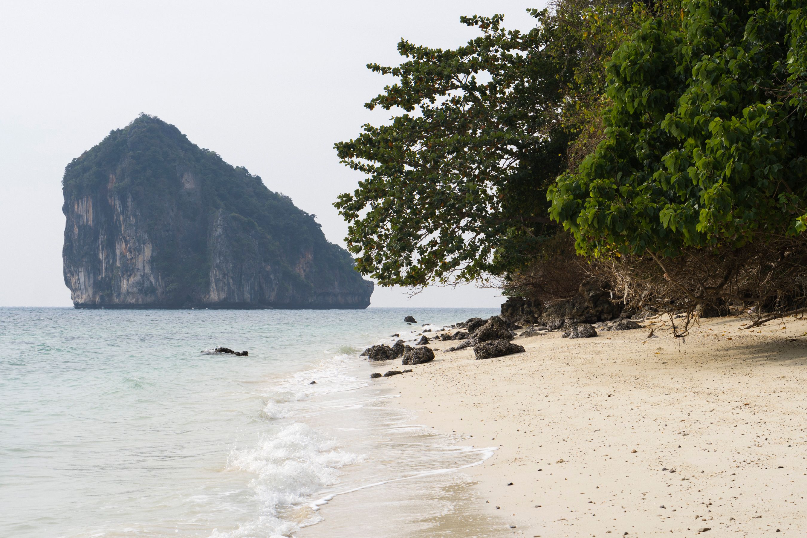Serene Beach with Limestone Cliff in Krabi · Free Stock Photo