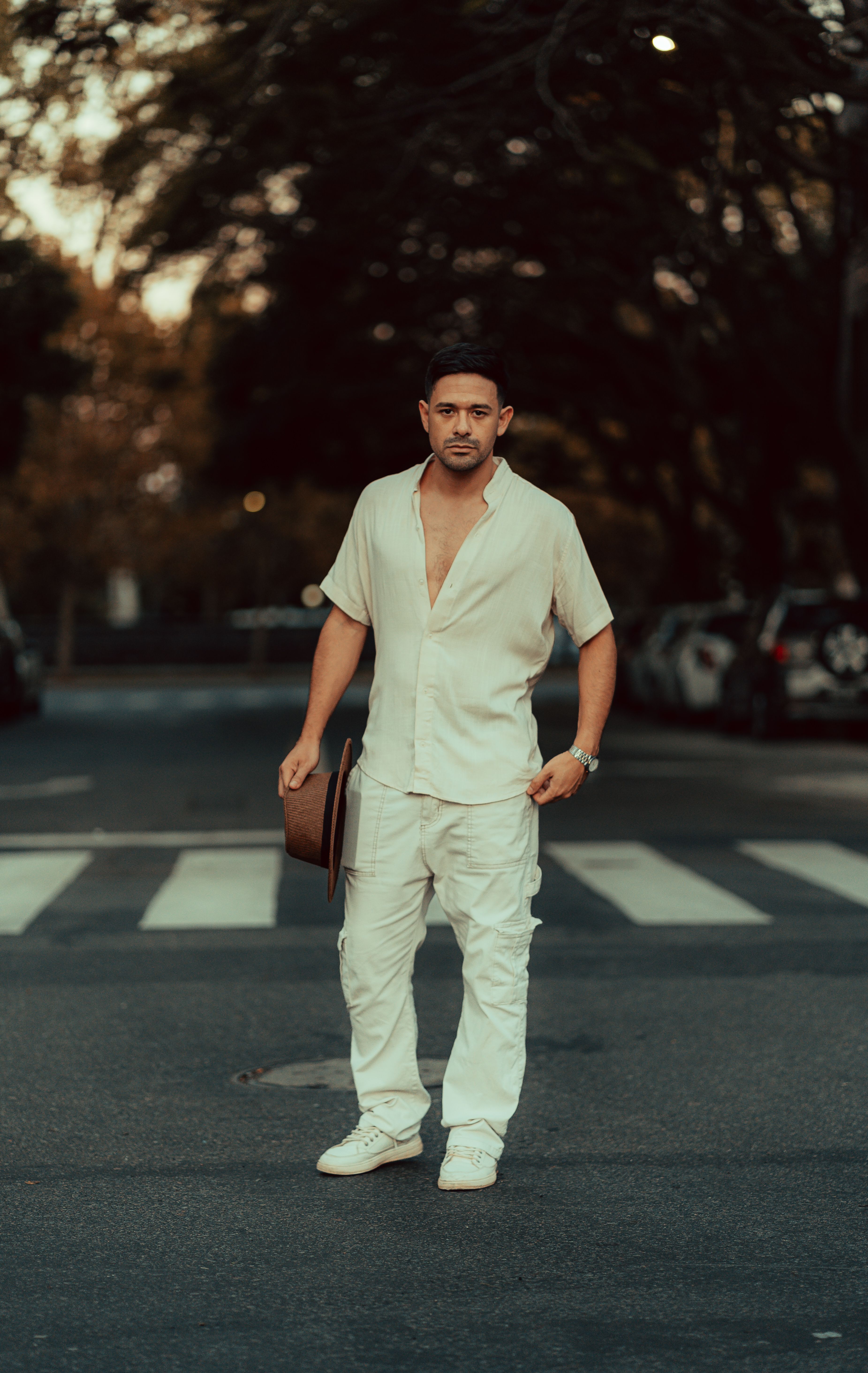 Stylish Man Standing on Urban Street at Dusk · Free Stock Photo