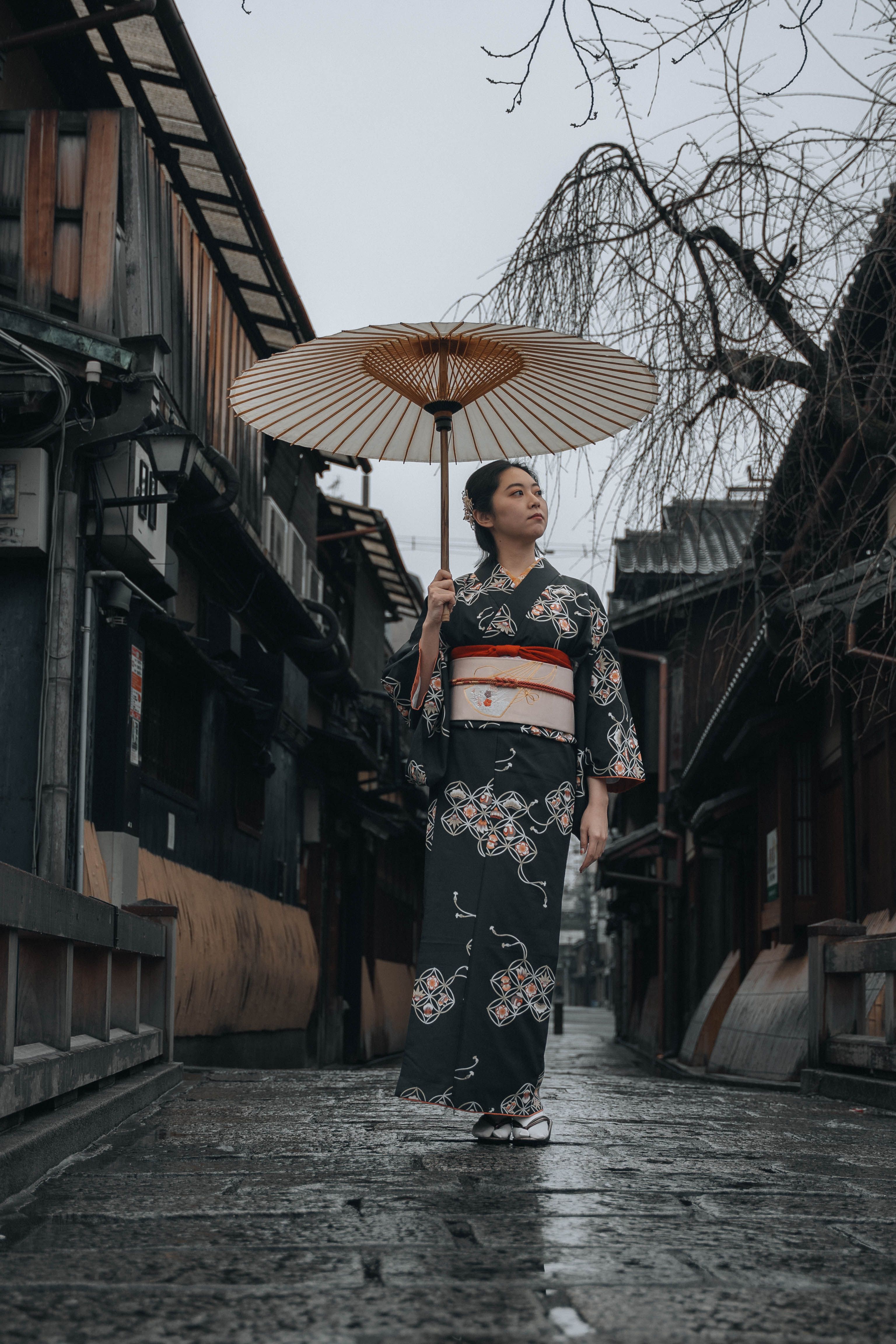 Kimono-Clad Woman Walking in Kyoto's Historic Streets · Free Stock Photo