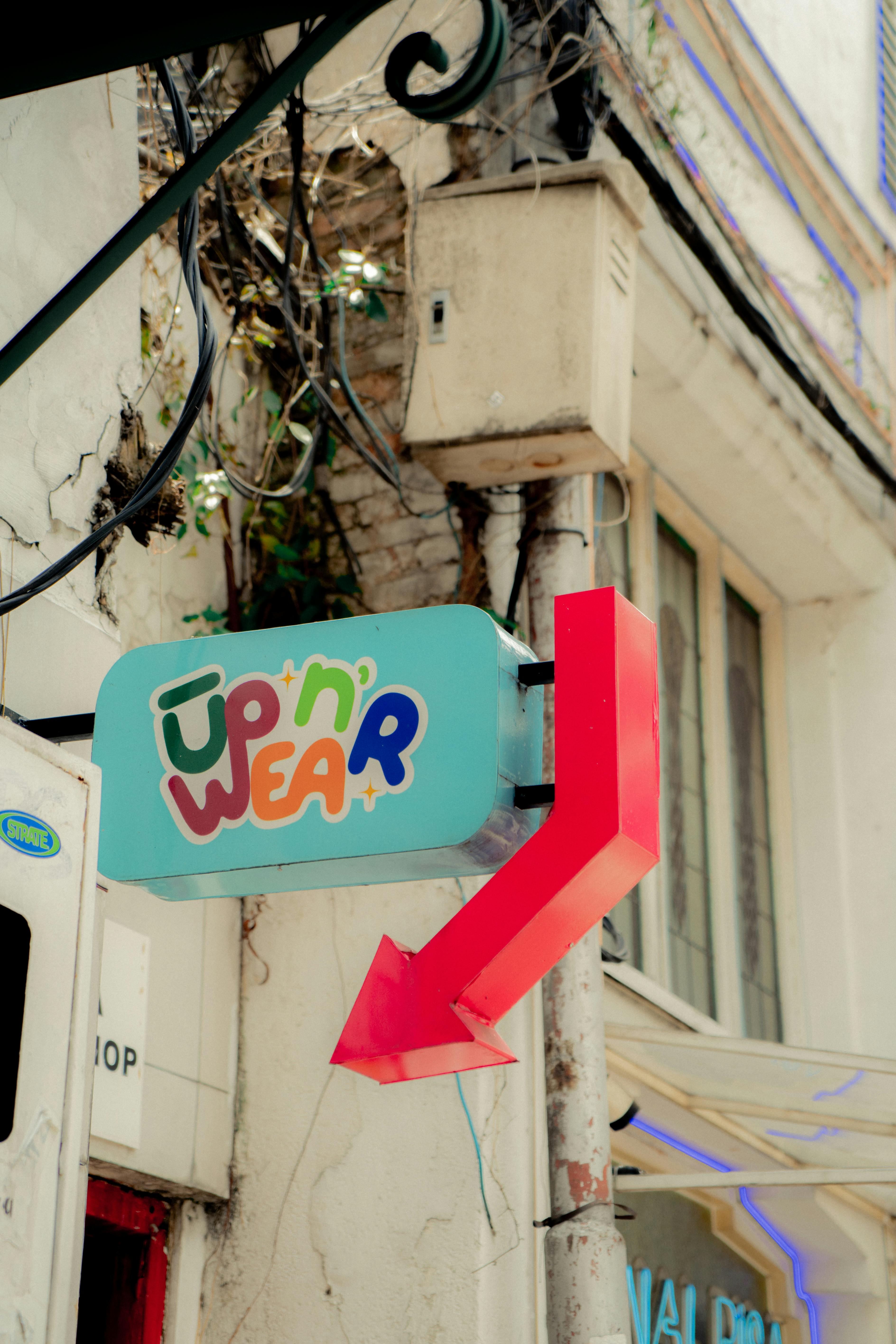 Colorful Shop Sign in West Java Street Scene · Free Stock Photo