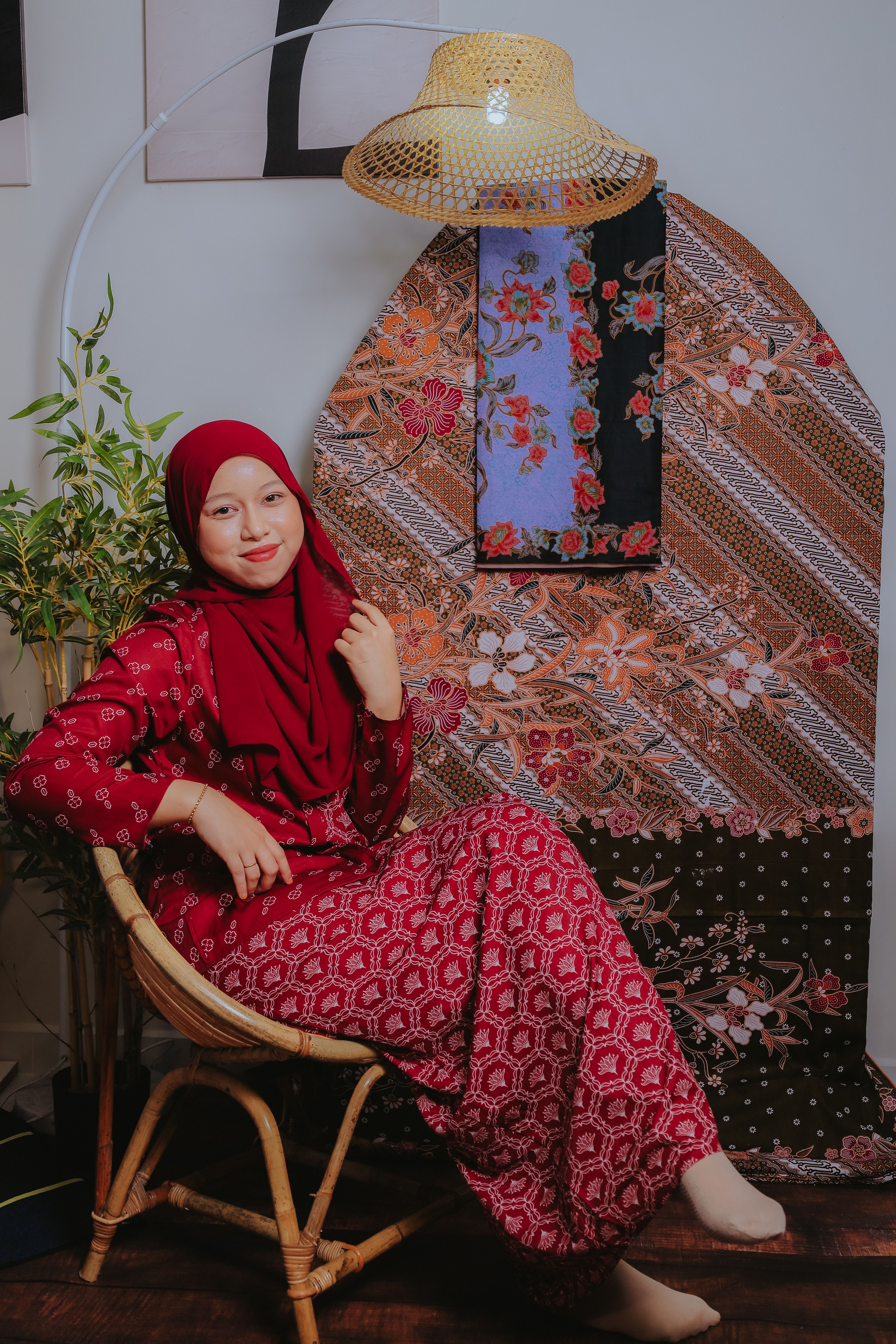 Traditional Fashion Portrait with Batik Background · Free Stock Photo