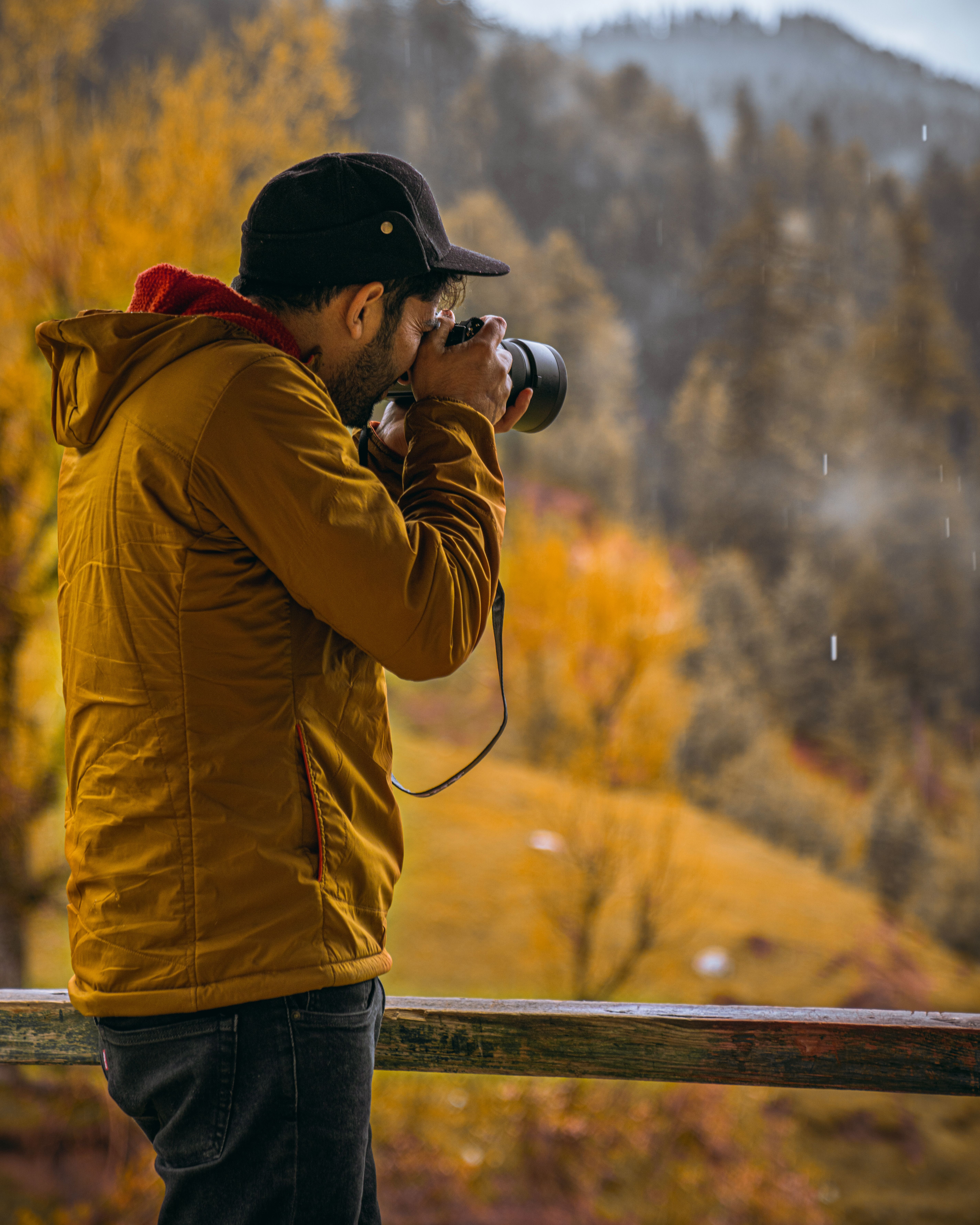 Photographer Capturing Autumn Landscape in Pahalgam · Free Stock Photo