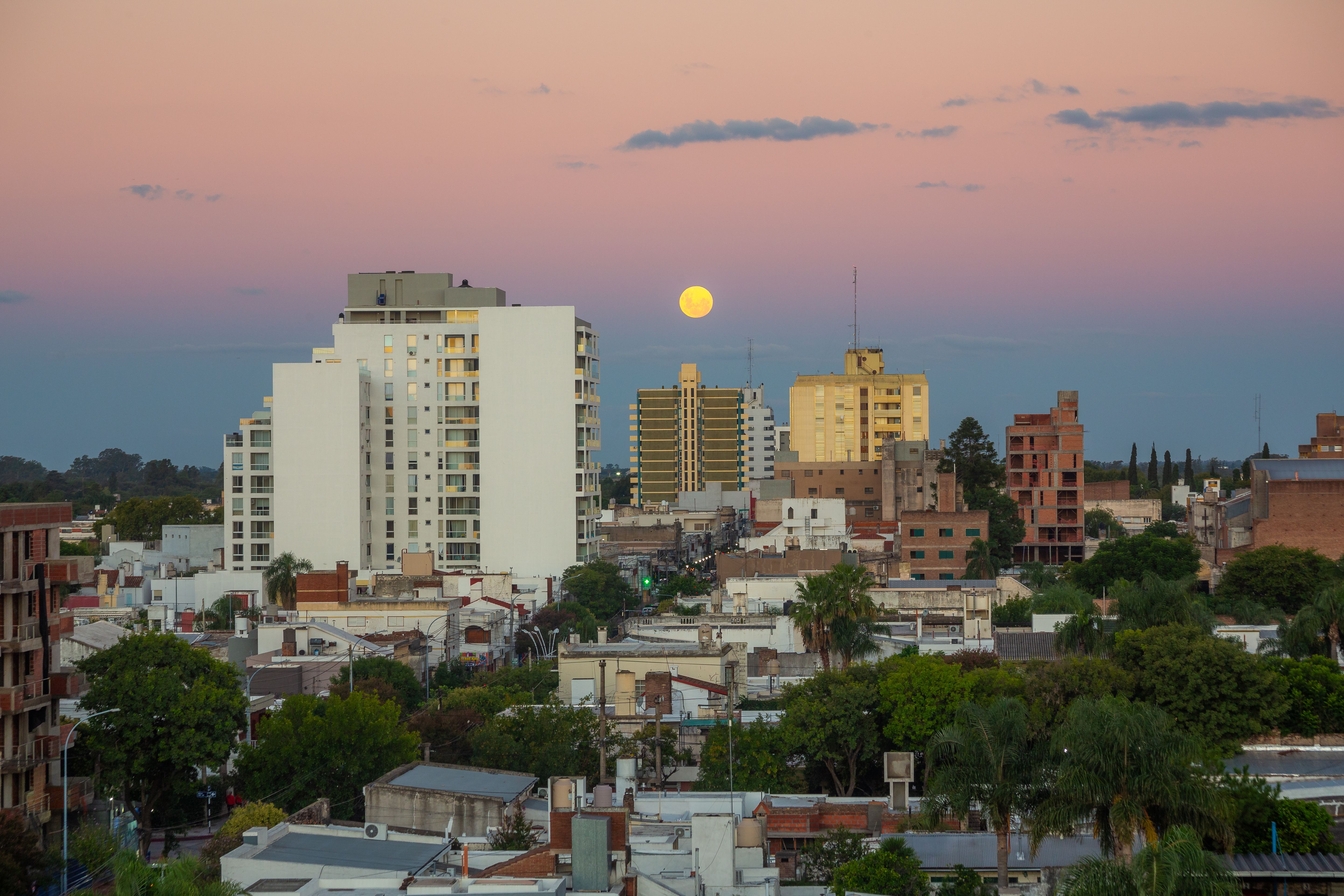 Full Moon Over Bell Ville Cityscape at Dusk · Free Stock Photo