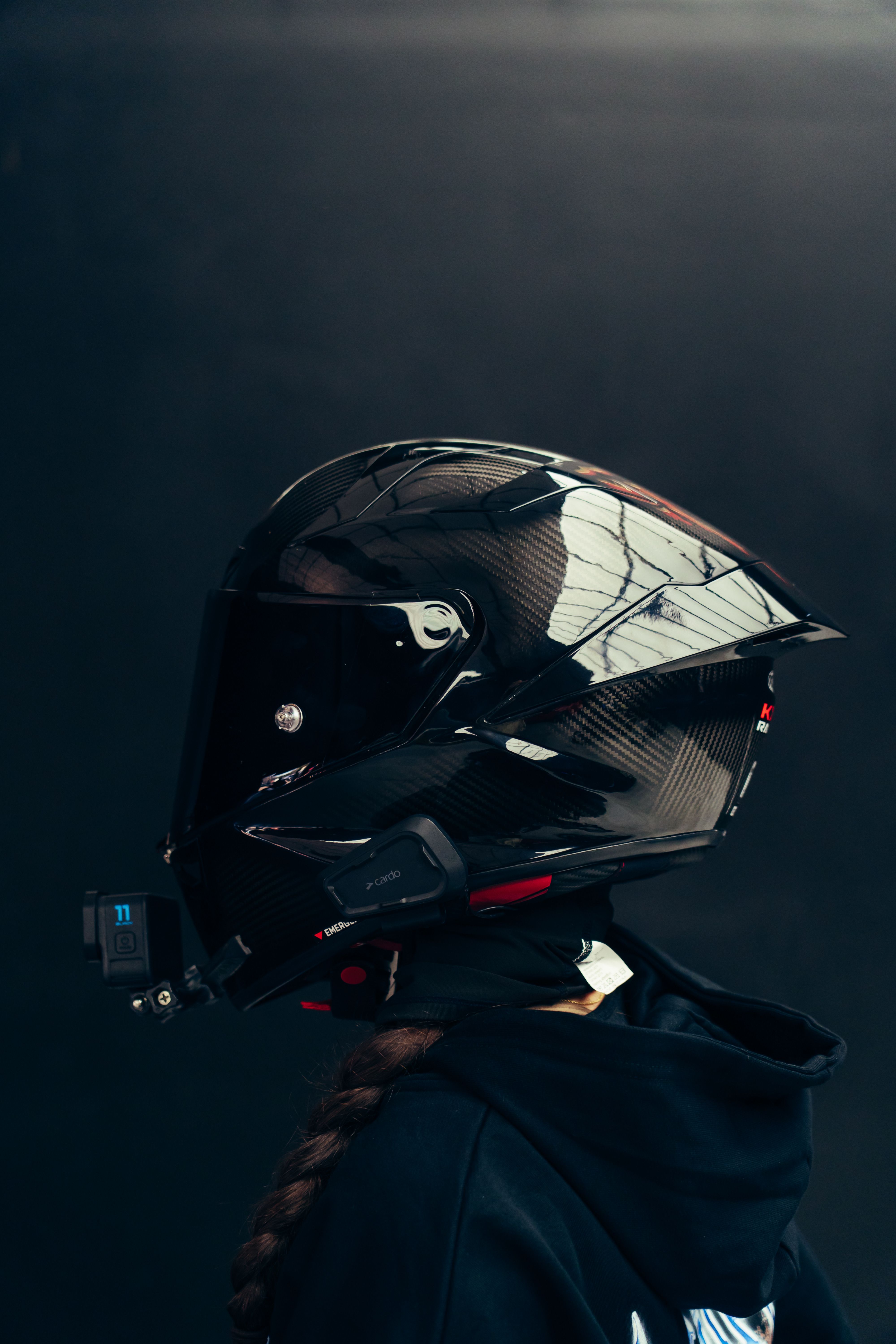 Stylish Carbon Fiber Motorcycle Helmet in Profile · Free Stock Photo