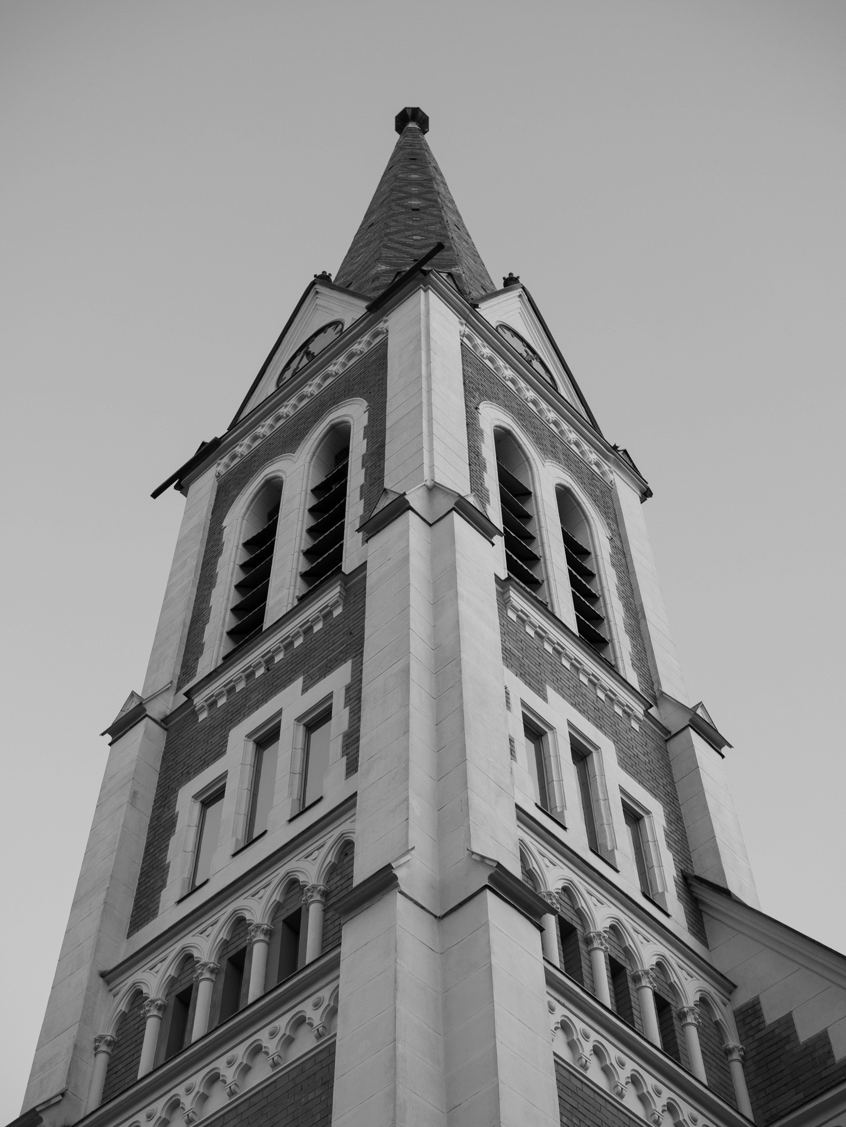 Monochrome View of Historic Church Spire in Villach · Free Stock Photo
