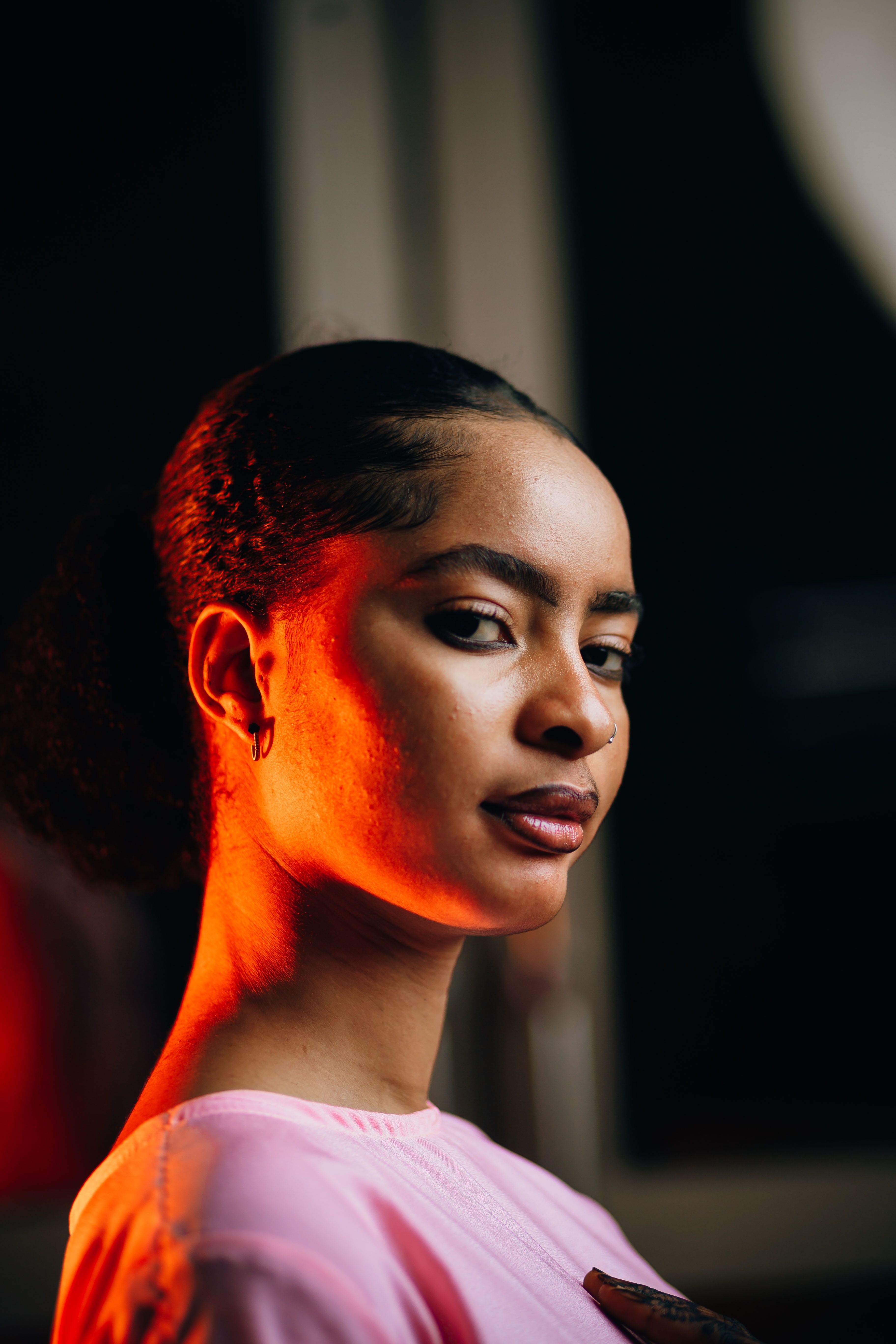 Elegant Portrait of a Woman with Warm Lighting · Free Stock Photo
