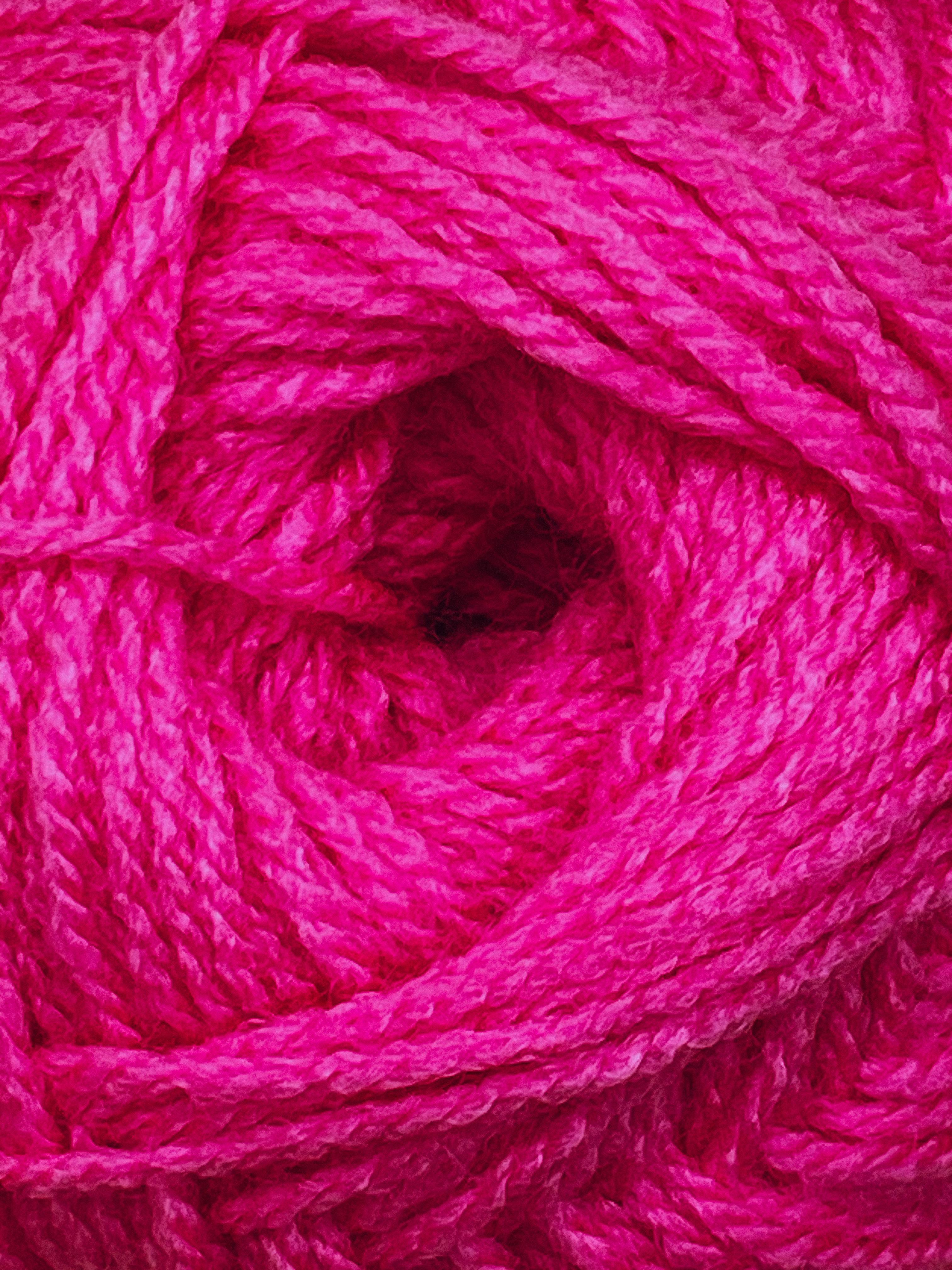 Primer Plano De Una Textura De Hilo Rosa Vibrante · Foto de stock gratuita