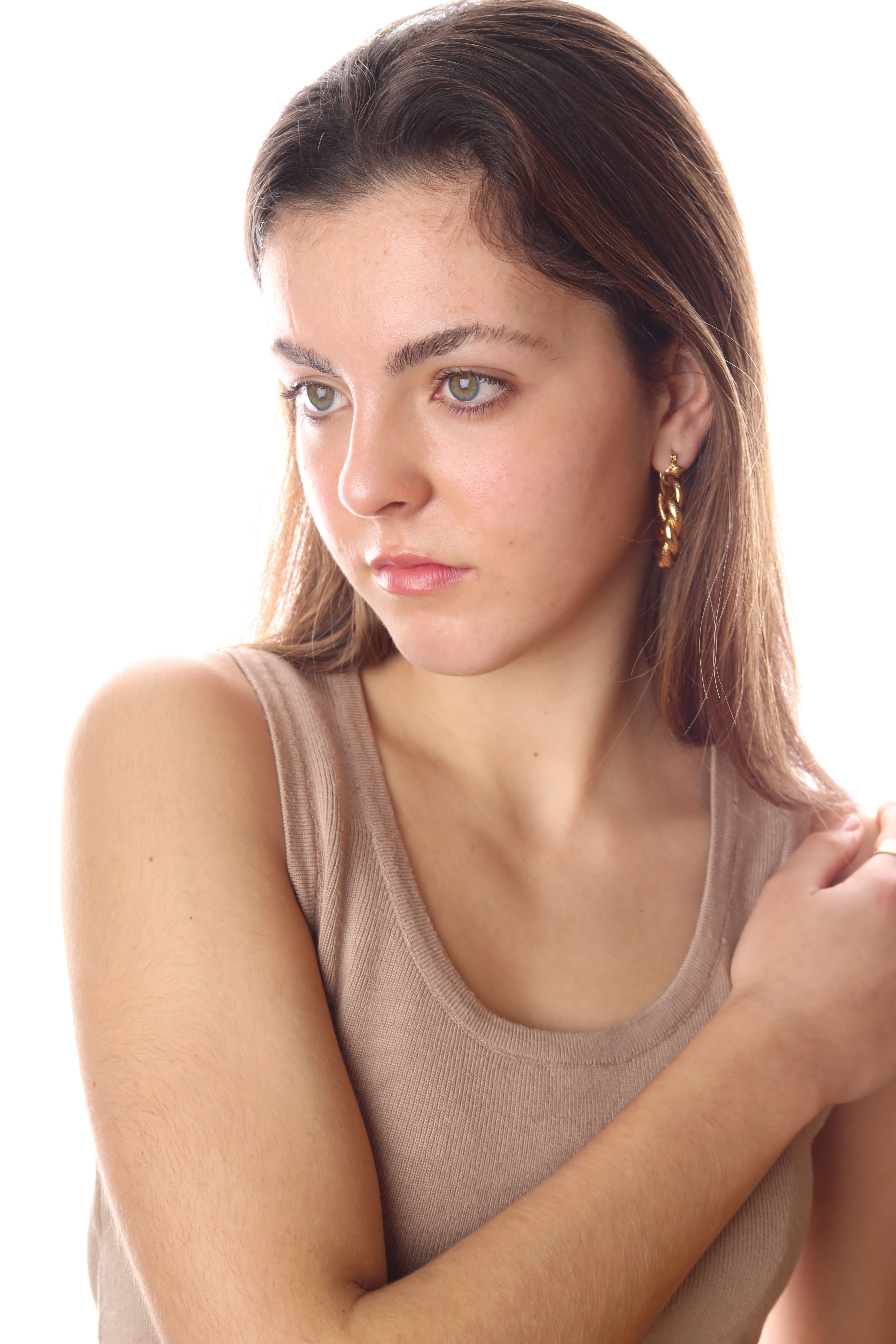 Elegant Portrait of Young Woman in Neutral Tones · Free Stock Photo