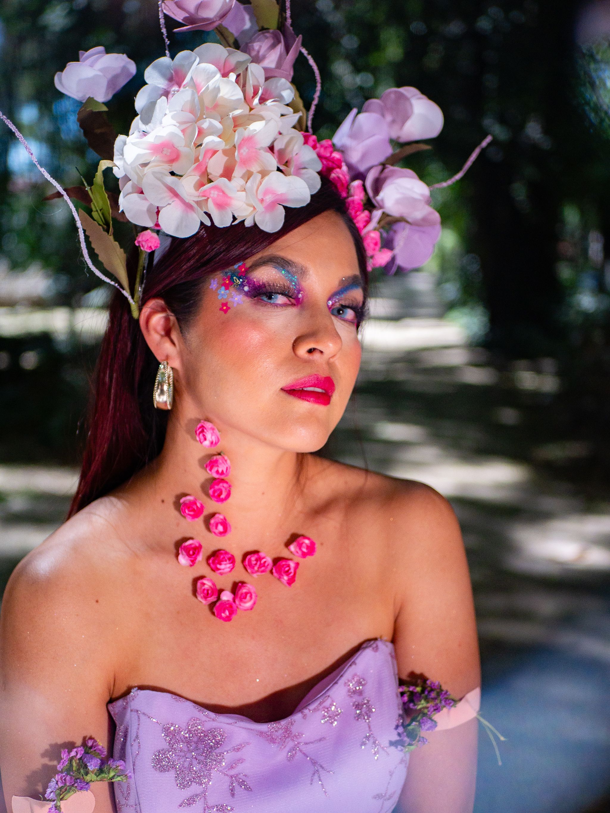 Elegant Woman in Floral Headpiece at Park · Free Stock Photo