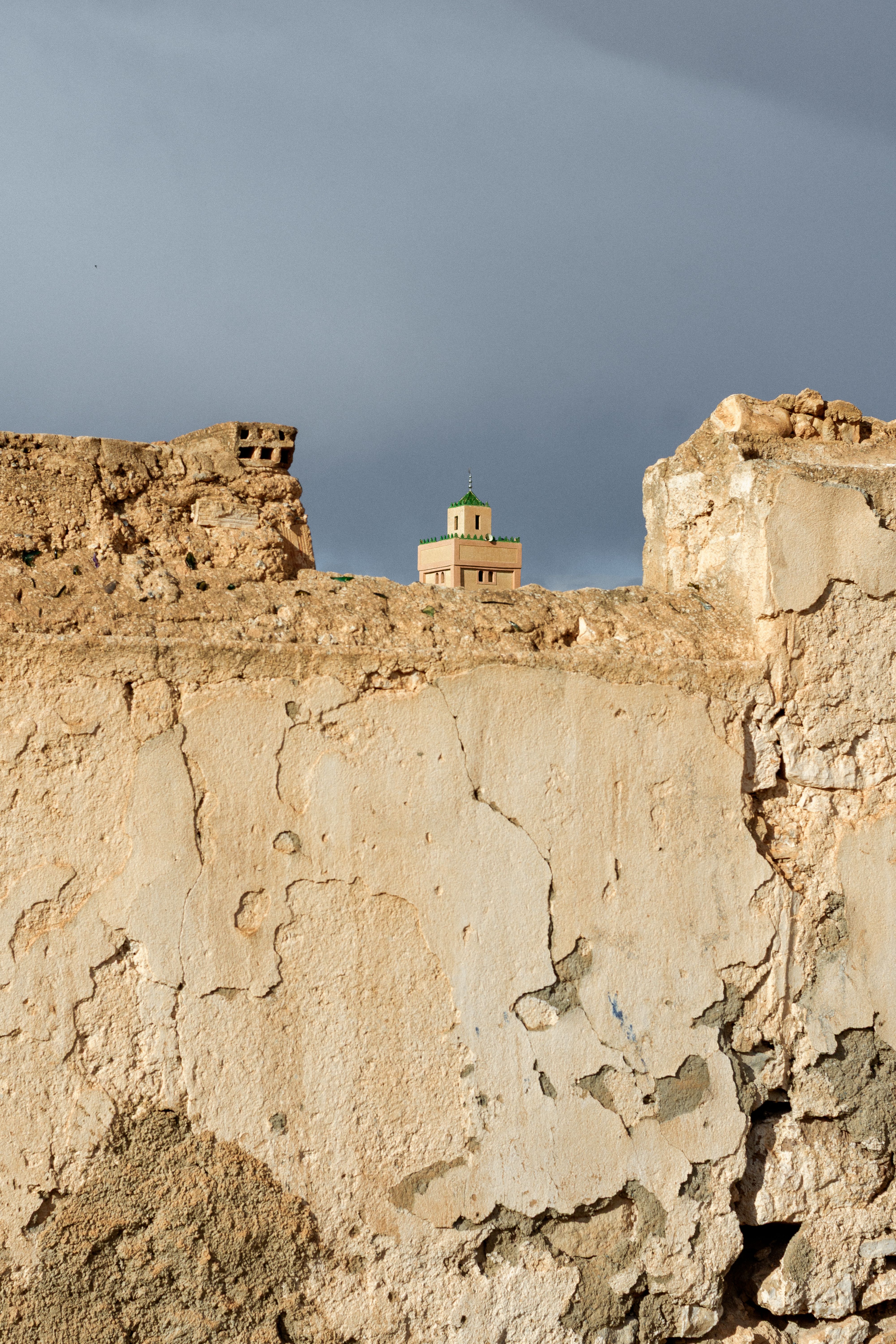 Historic Mosque Seen Through Ancient Walls in Morocco · Free Stock Photo