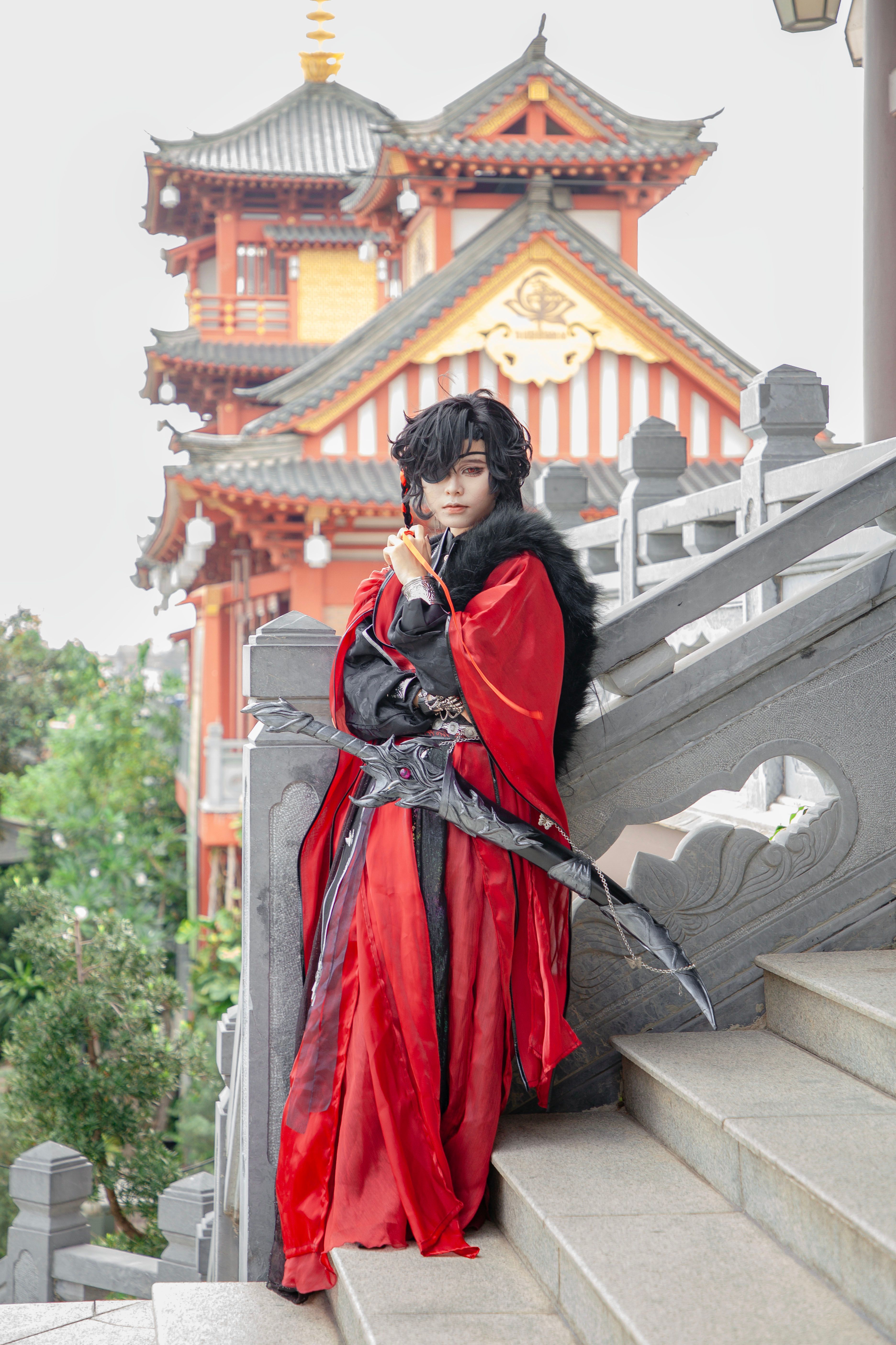 Elegant Cosplay Portrait at Asian Temple Steps · Free Stock Photo