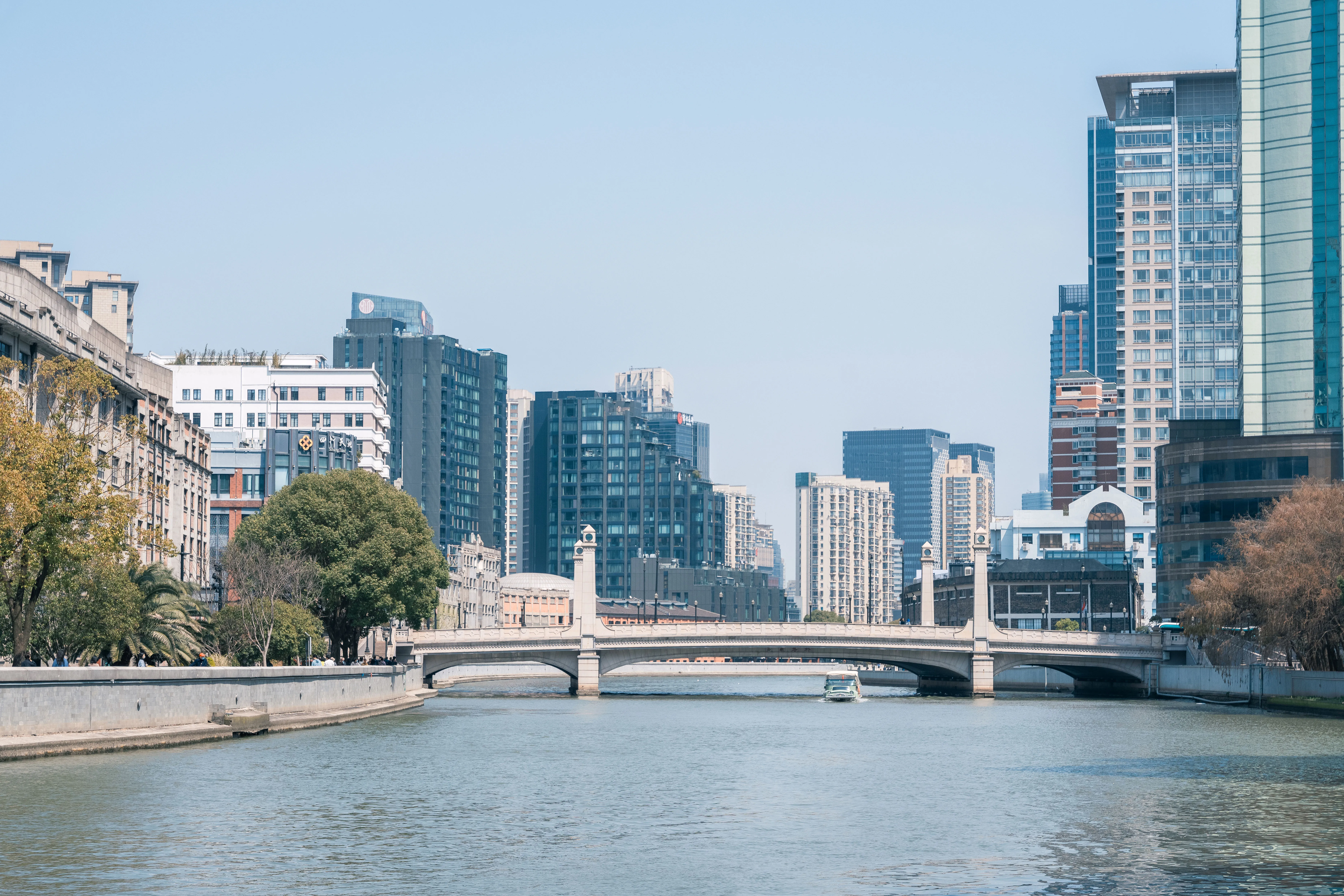 Scenic urban river view with architectural skyline · Free Stock Photo
