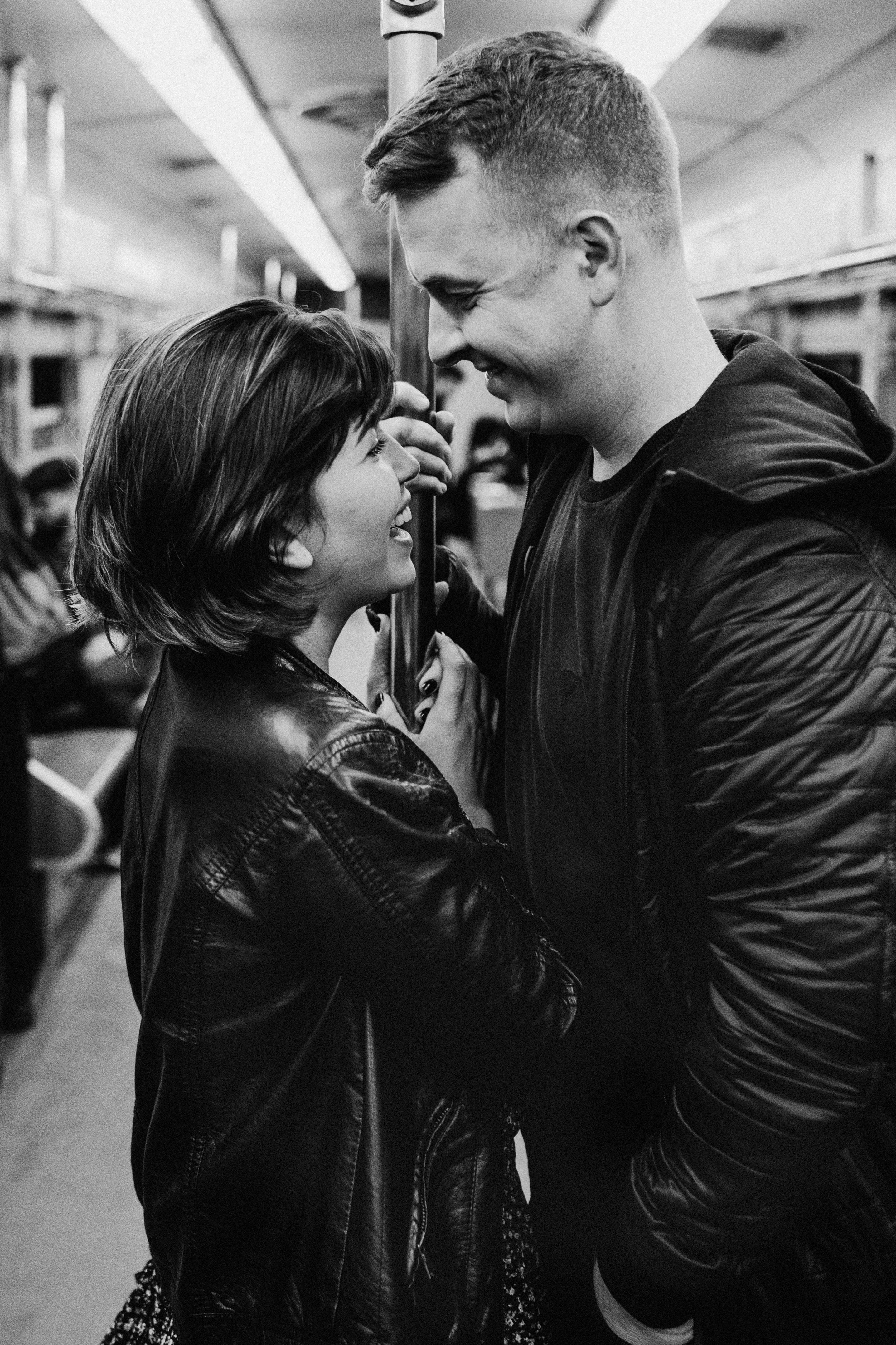 man-in-black-hoodie-in-front-of-woman-in-leather-jacket-free-stock-photo