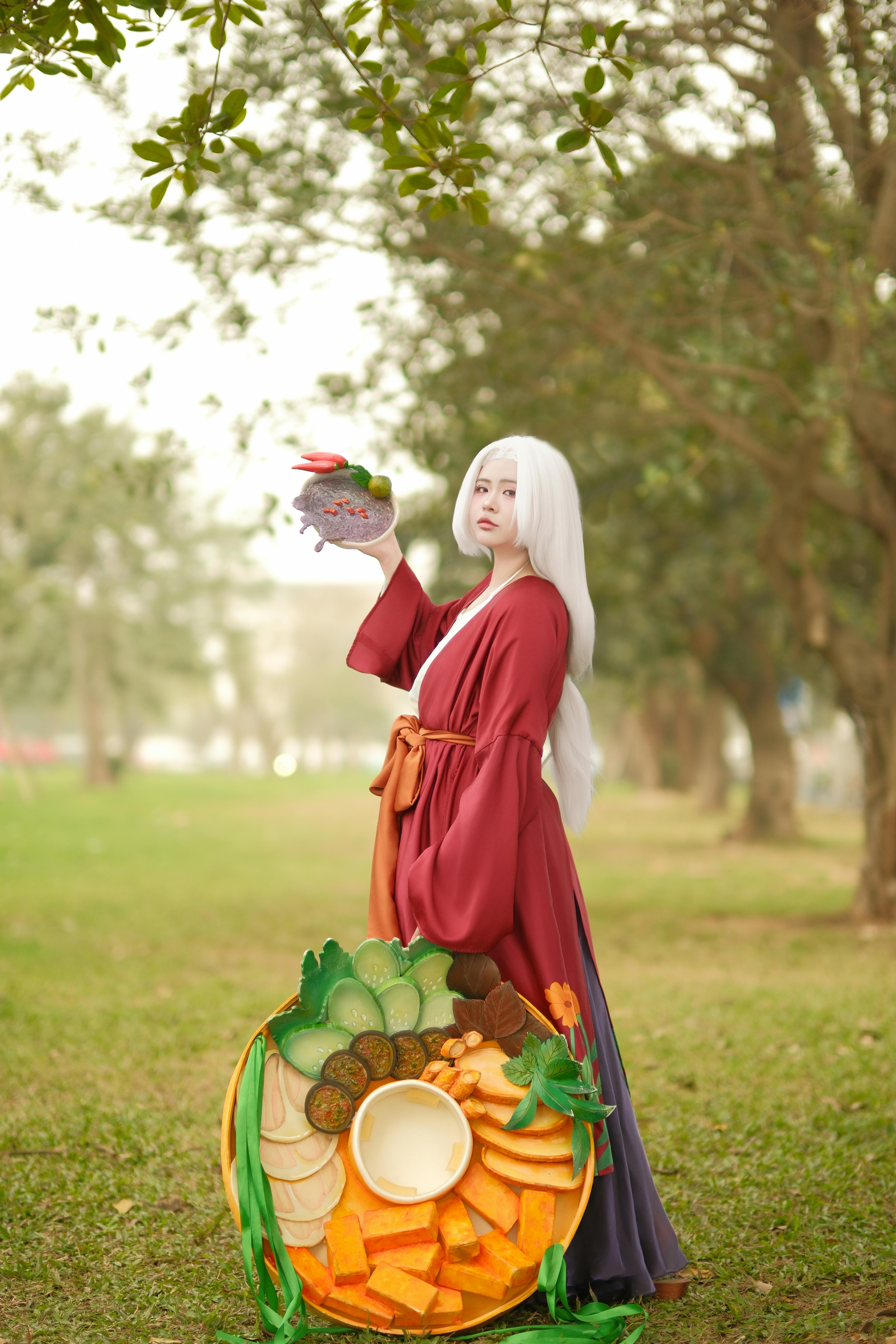 Cosplayer with Fantasy Platter Outdoors · Free Stock Photo