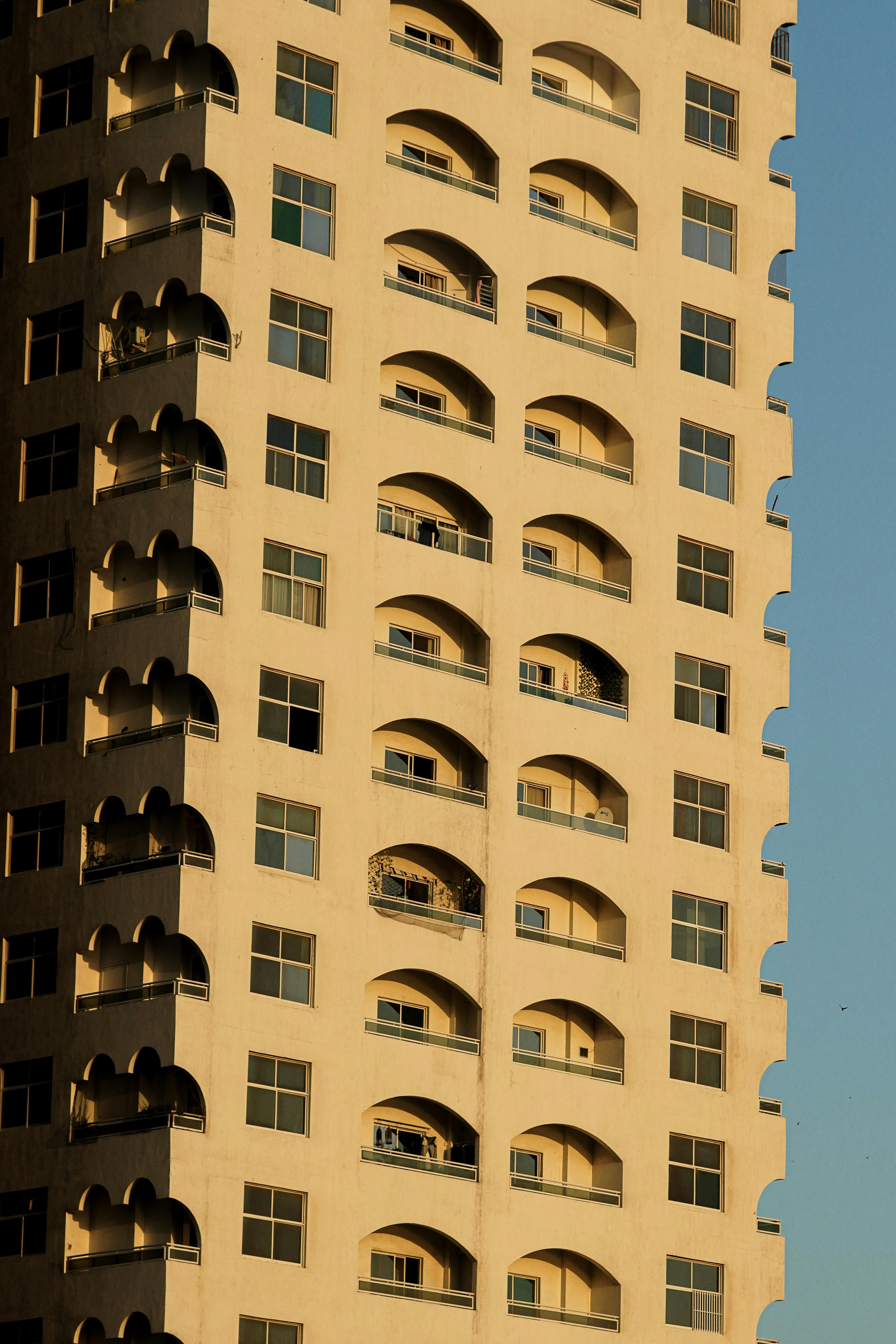 Modern Architectural Building in Dubai with Unique Arc Design · Free ...