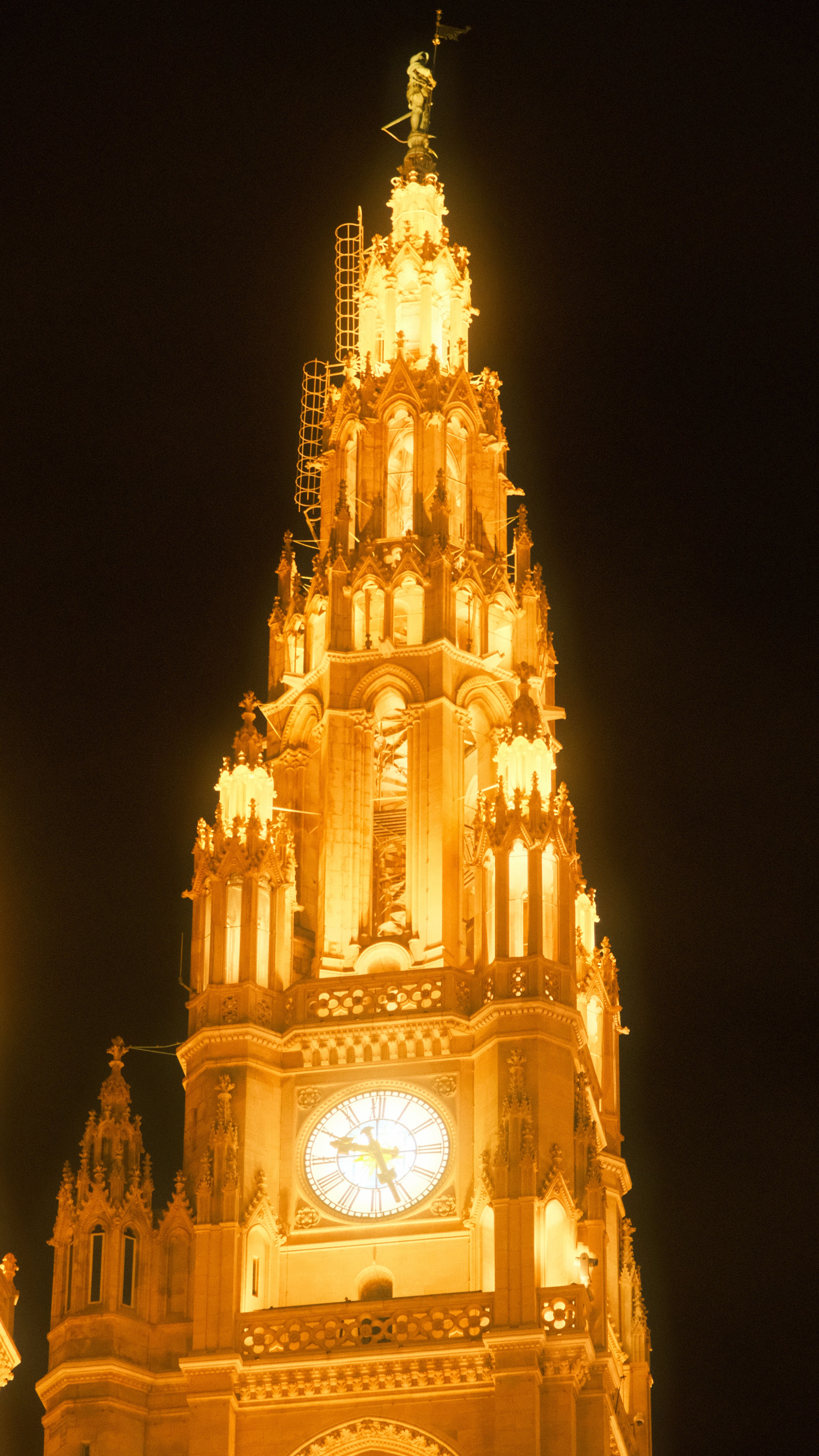 Illuminated Gothic Clock Tower at Night · Free Stock Photo