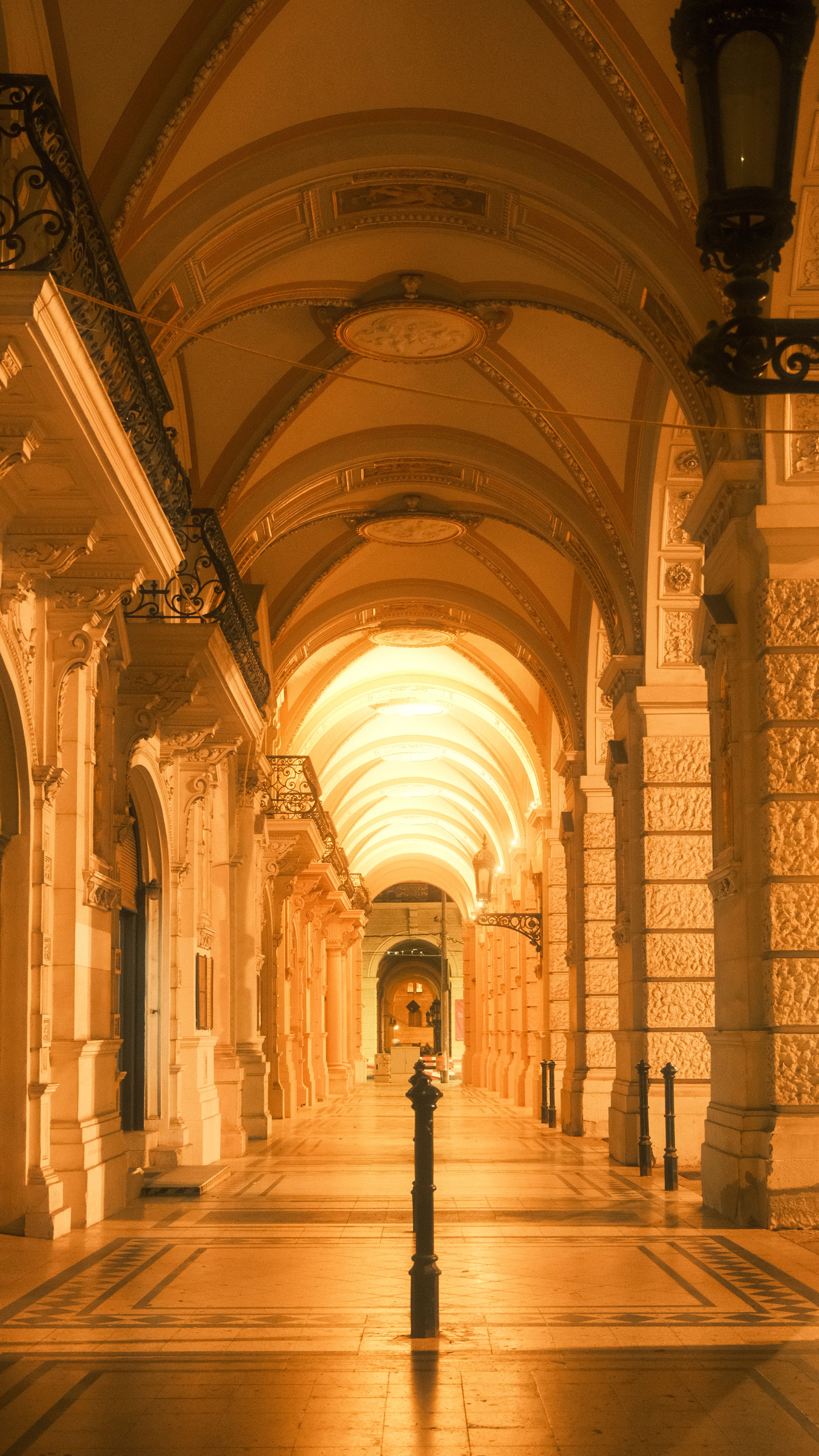 Ornate European Archway with Warm Lighting · Free Stock Photo