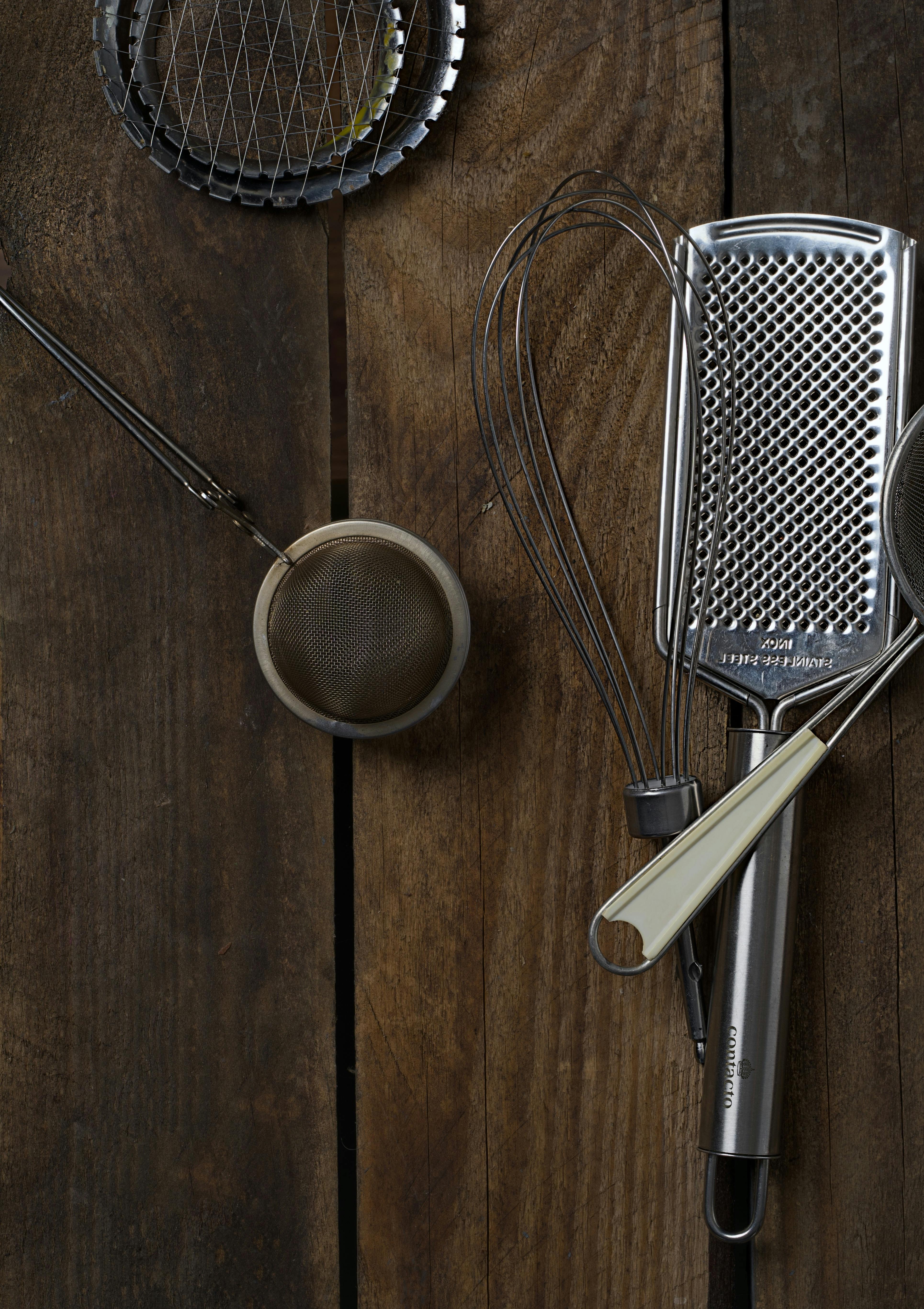 Rustic Kitchen Utensils Set on Wooden Background · Free Stock Photo