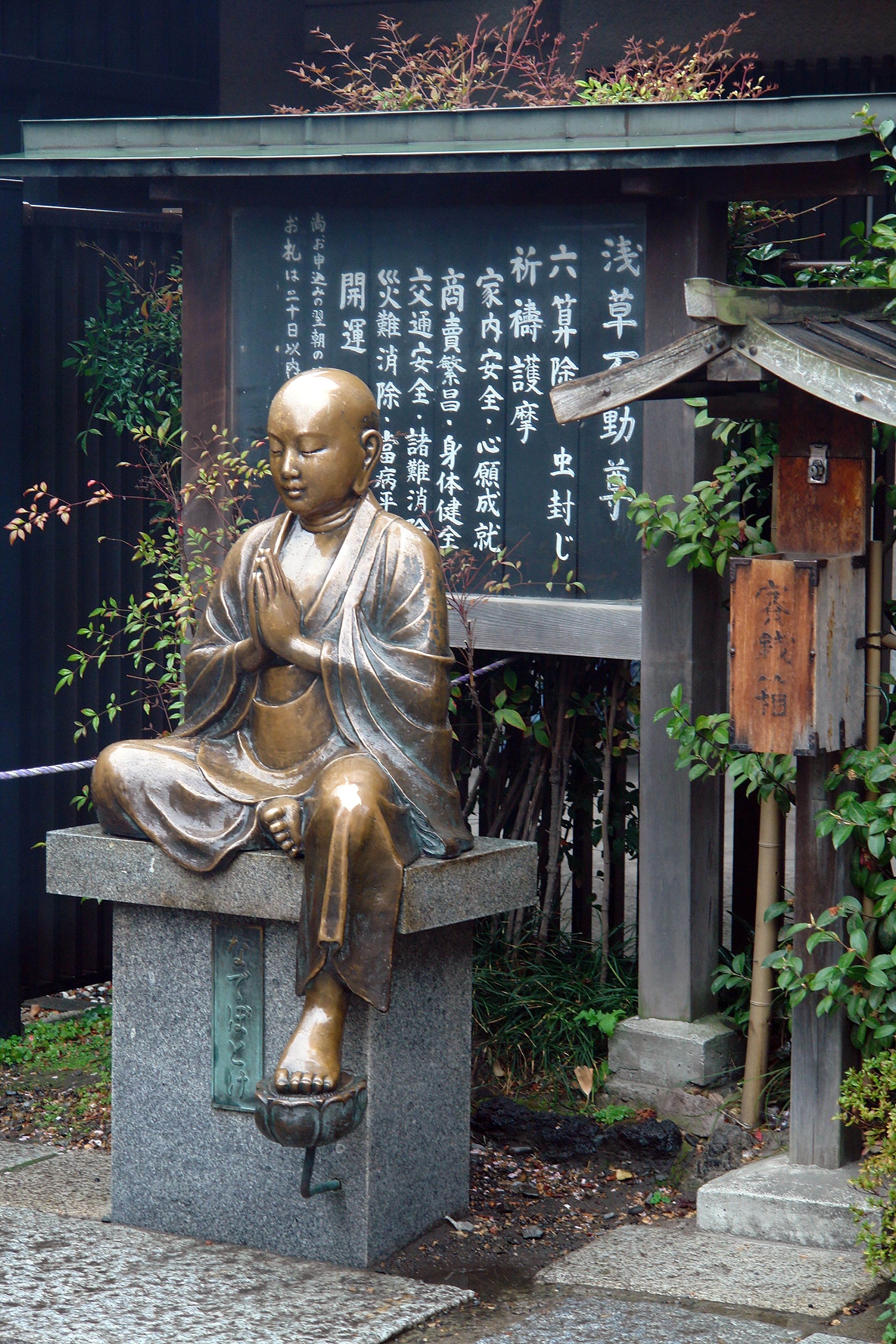 Bronze Buddha Statue in a Zen Garden · Free Stock Photo