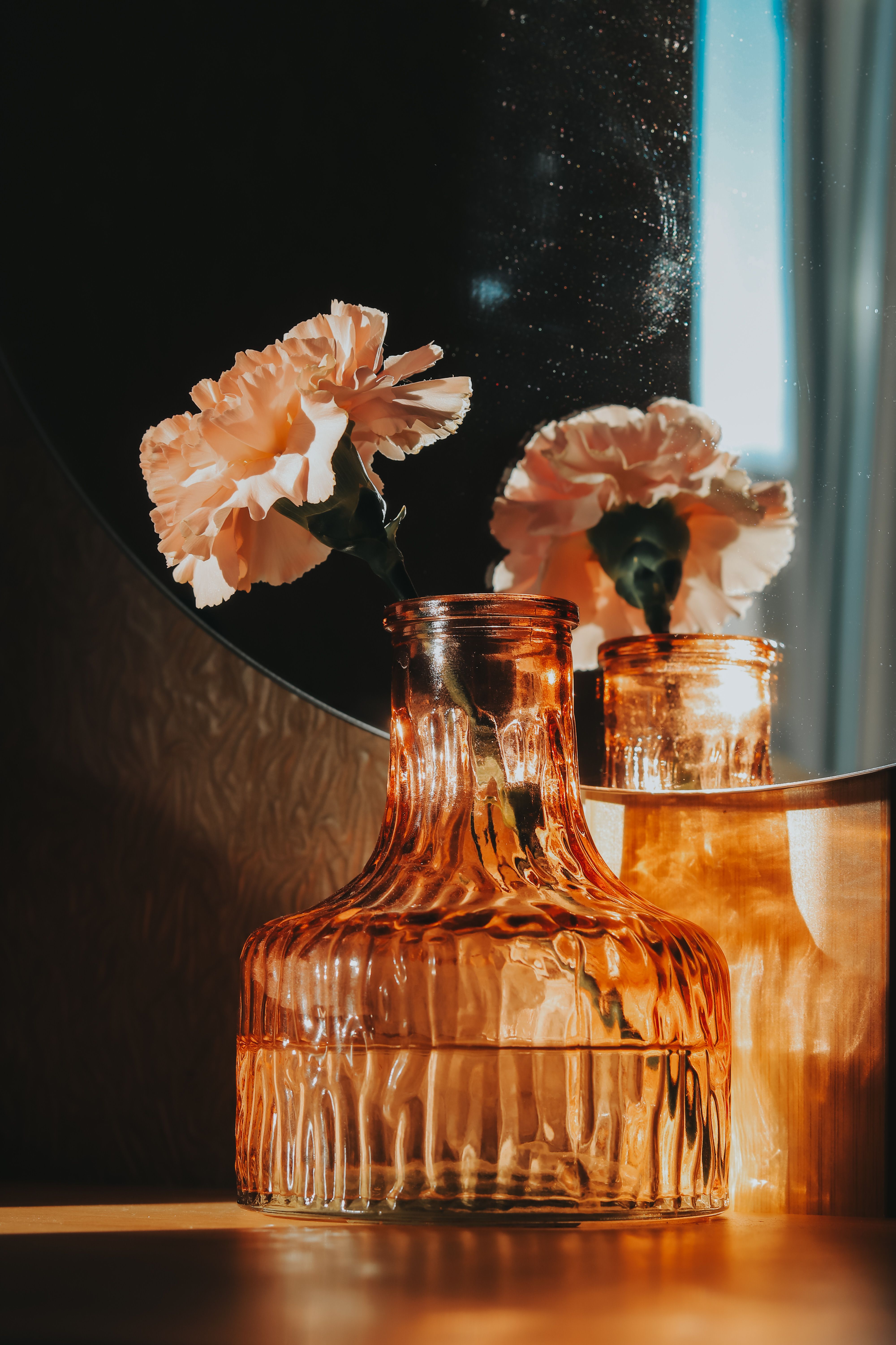 Elegant Reflection of Flowers in Glass Vase · Free Stock Photo