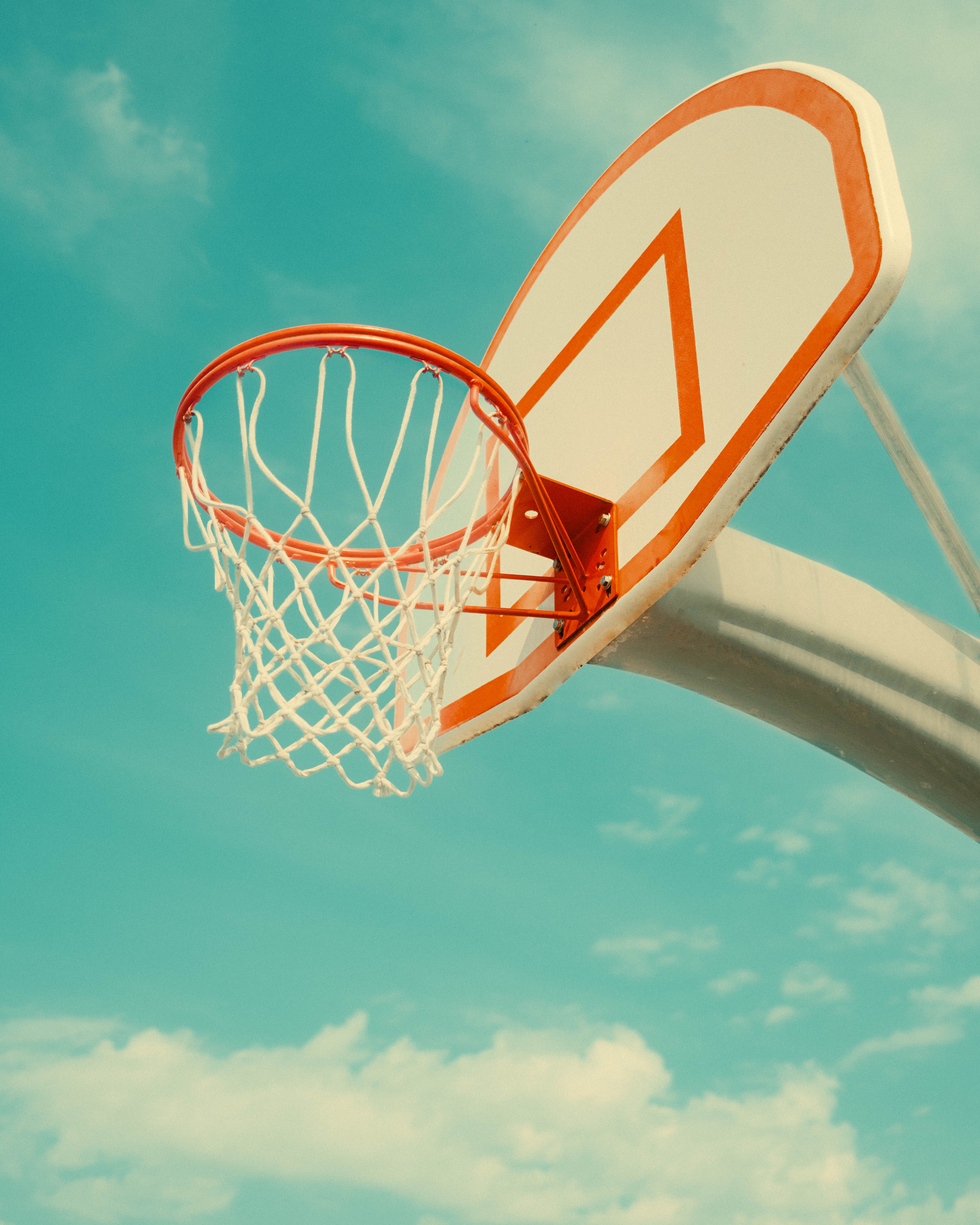 Outdoor Basketball Hoop Under Blue Sky · Free Stock Photo