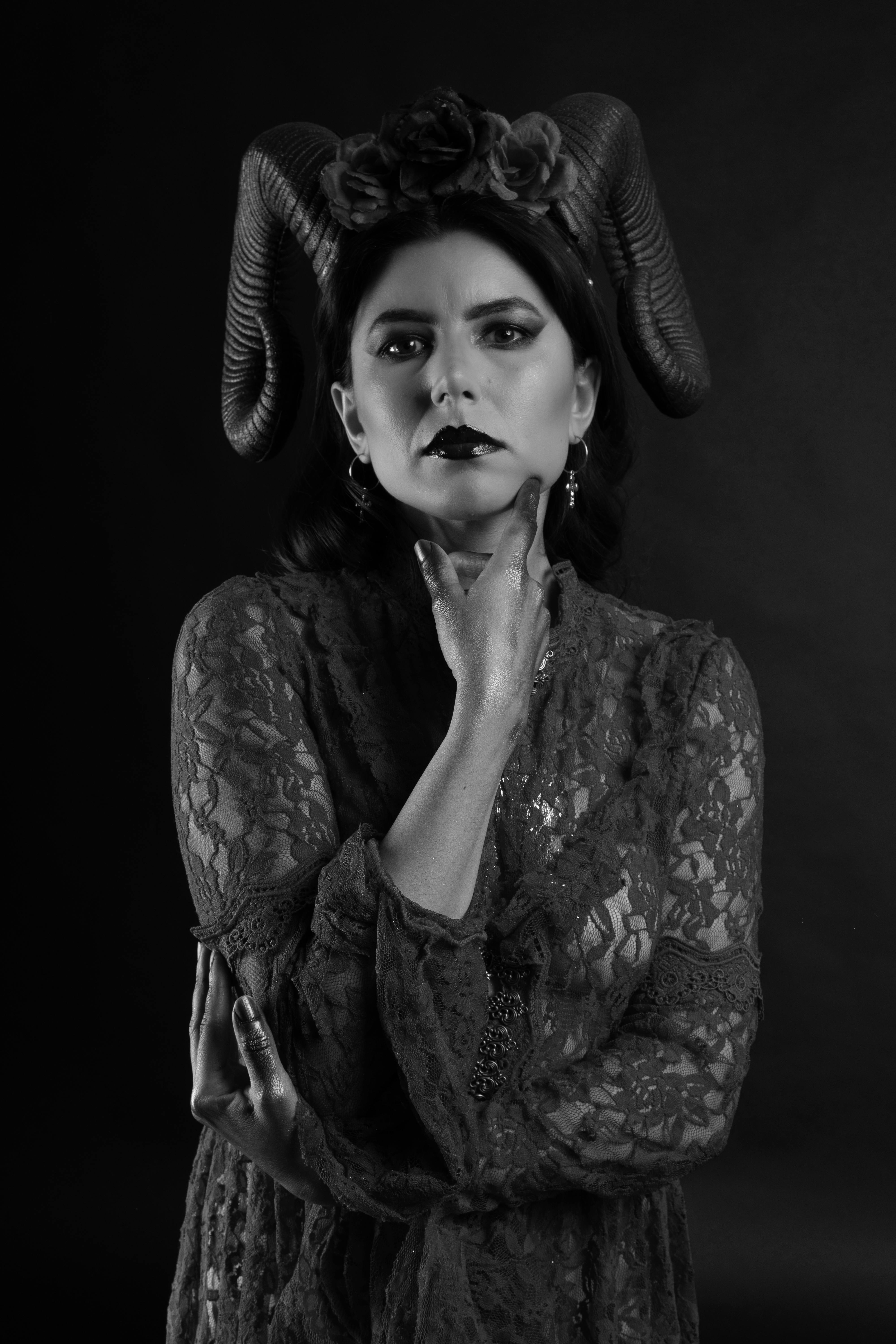 Gothic Woman with Horns in Dramatic Black and White · Free Stock Photo