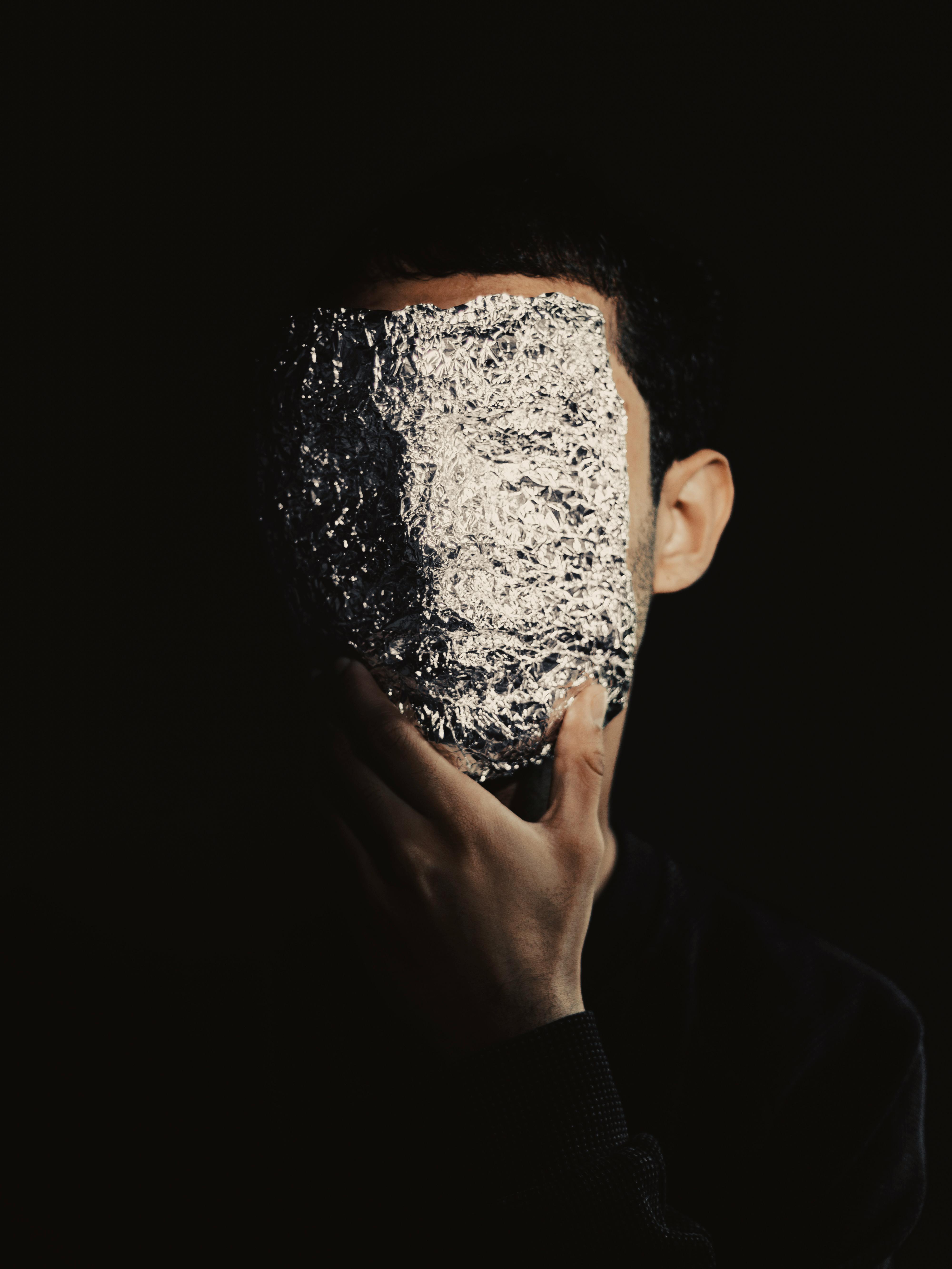 Abstract Portrait with Aluminum Foil Mask · Free Stock Photo