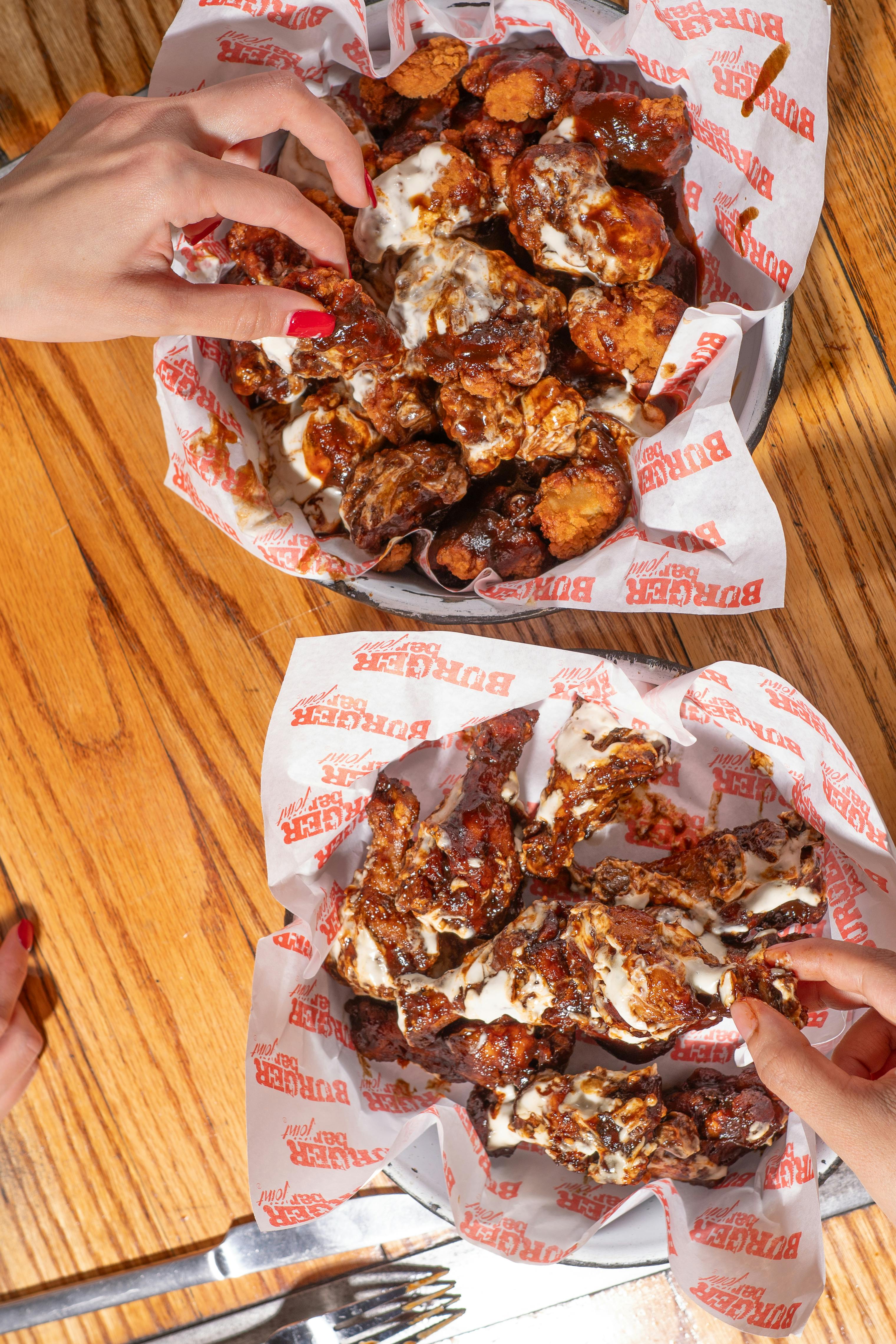Top View of Delicious Chicken Wings Feast · Free Stock Photo