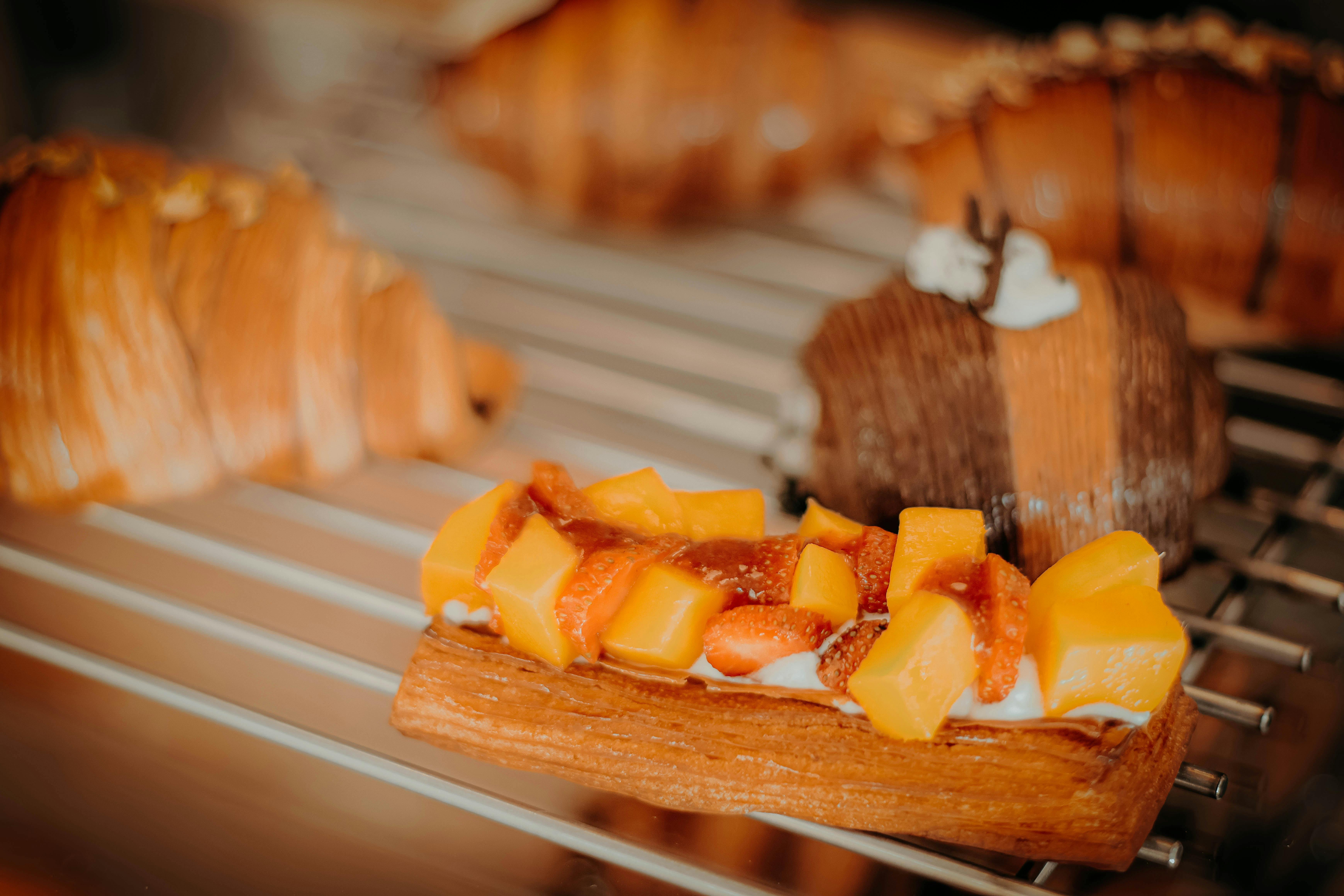 Delicious Mango Pastry with French Croissants · Free Stock Photo