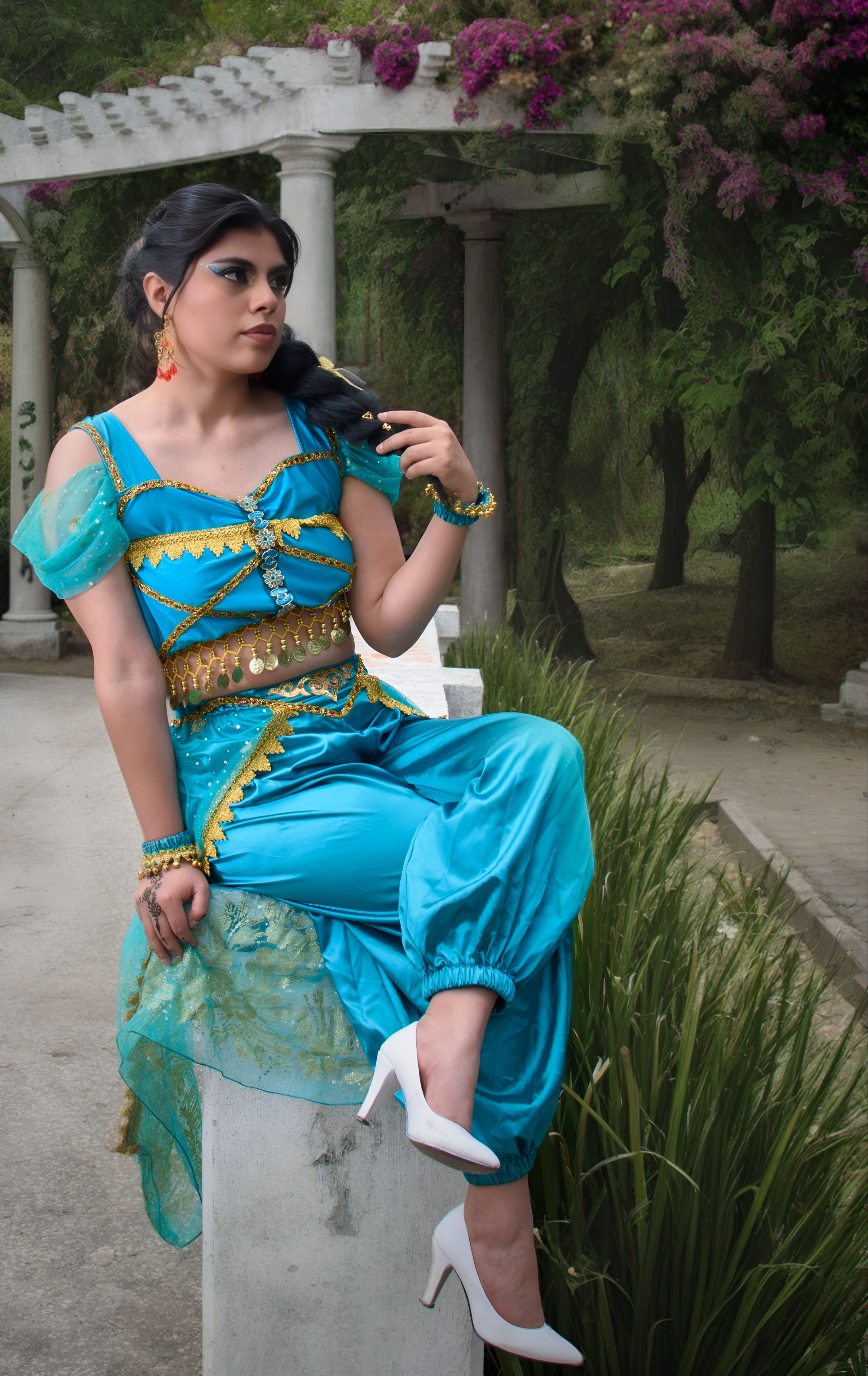 Woman in Princess Costume Sitting Outdoors · Free Stock Photo