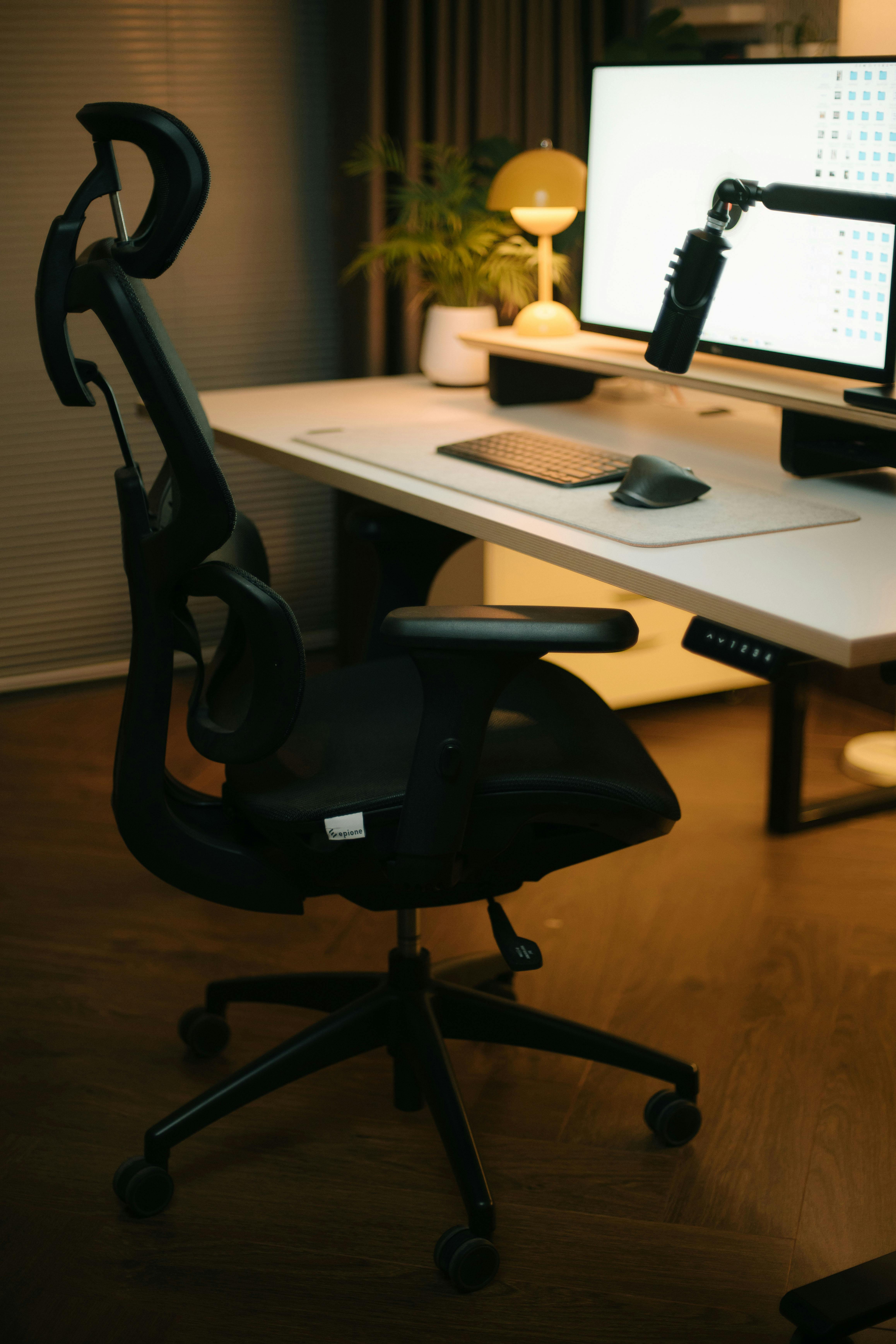 Modern Ergonomic Office Setup with Desk and Chair · Free Stock Photo