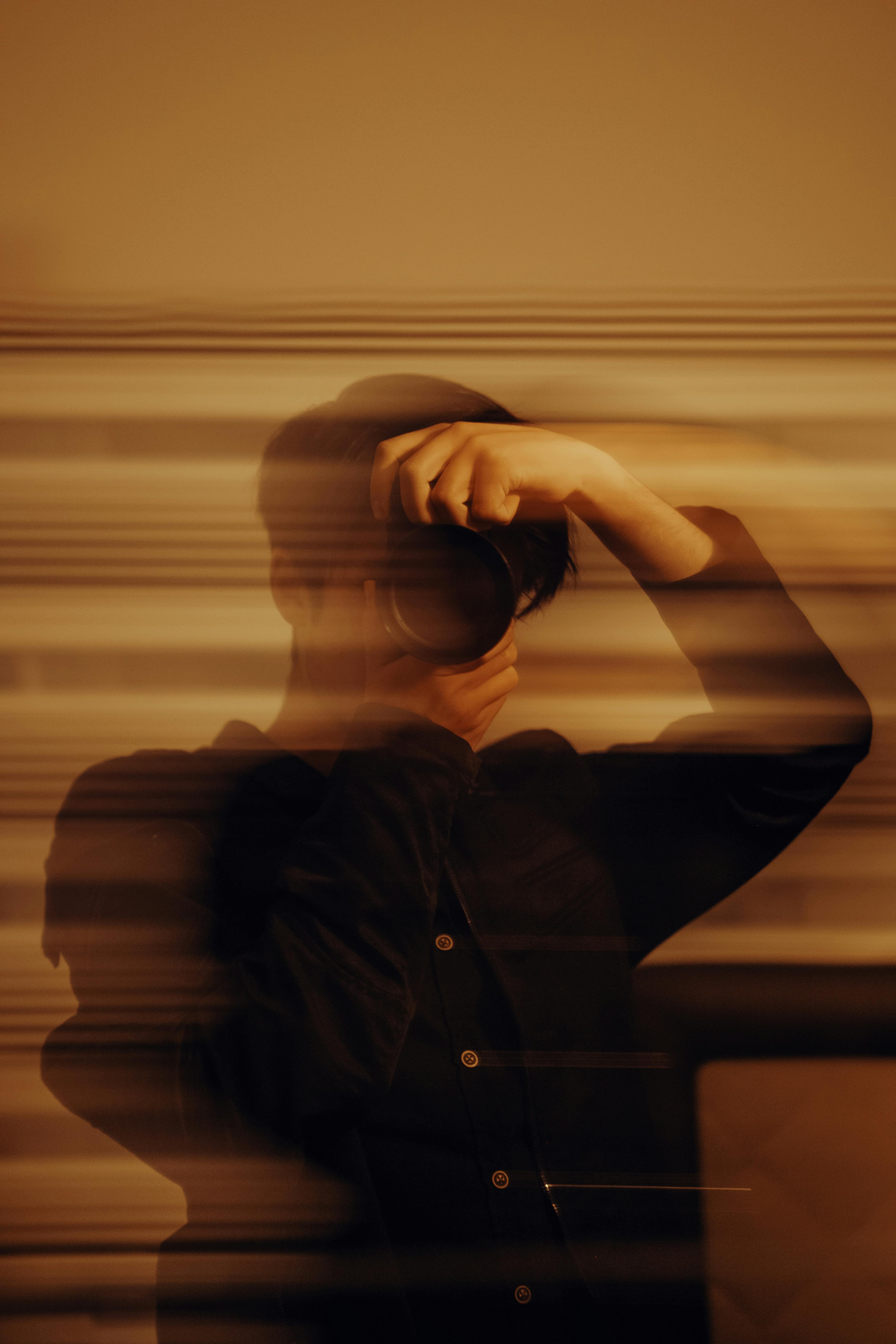 Artistic Self-Portrait with Motion Blur · Free Stock Photo