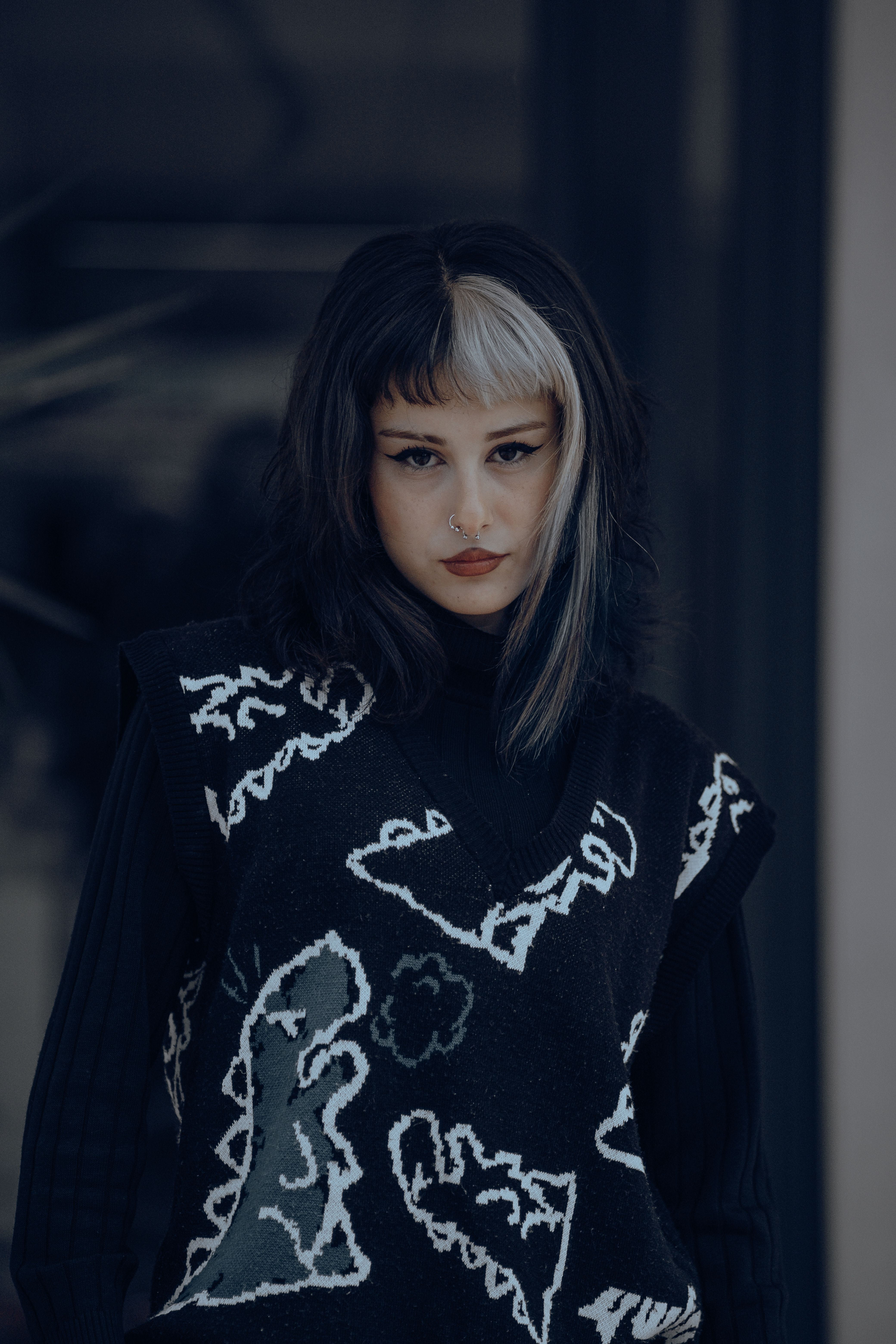 Stylish Woman in Graphic Sweater with Two-Tone Hair · Free Stock Photo