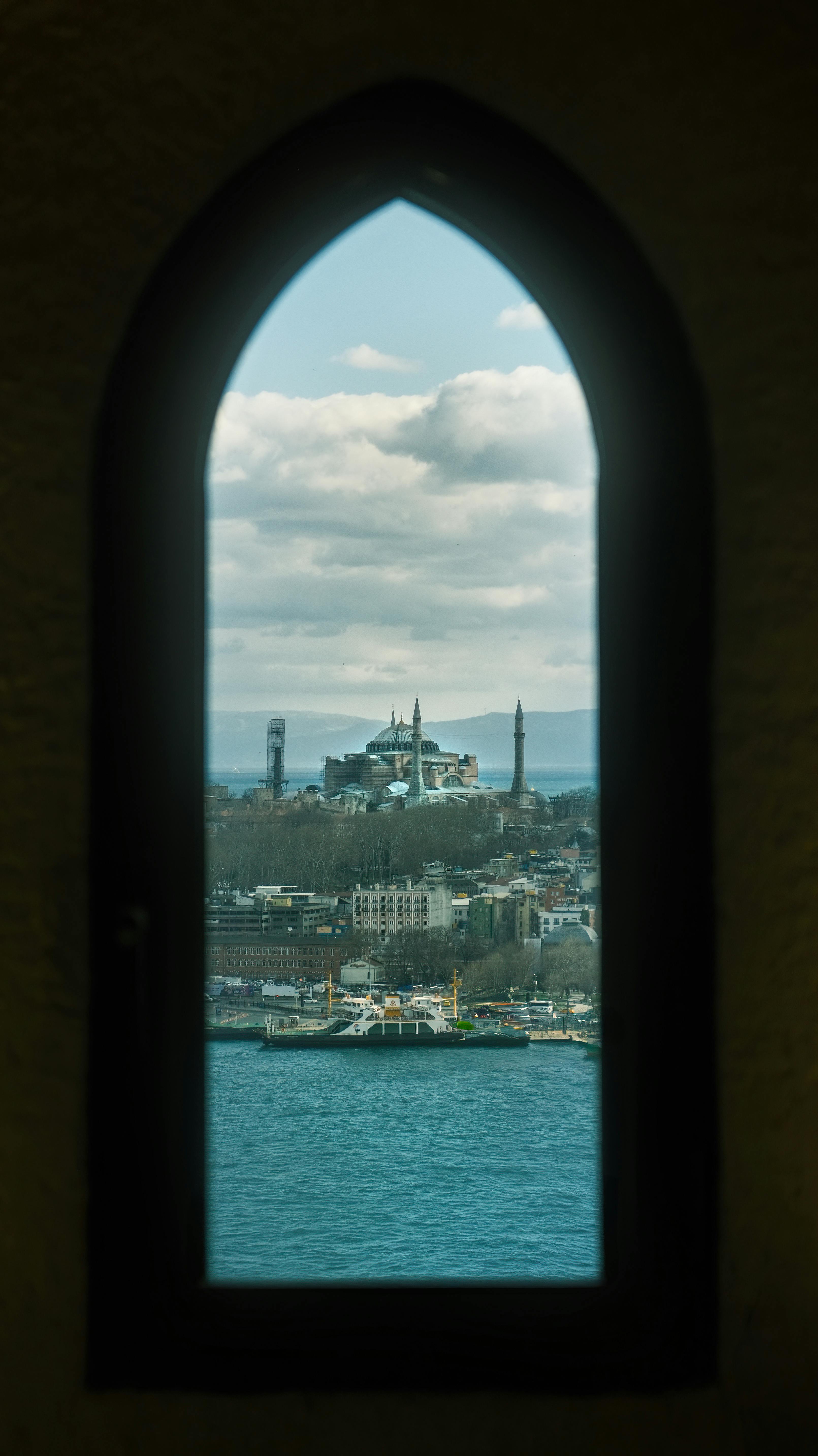 Arched Window View of Istanbul Skyline · Free Stock Photo