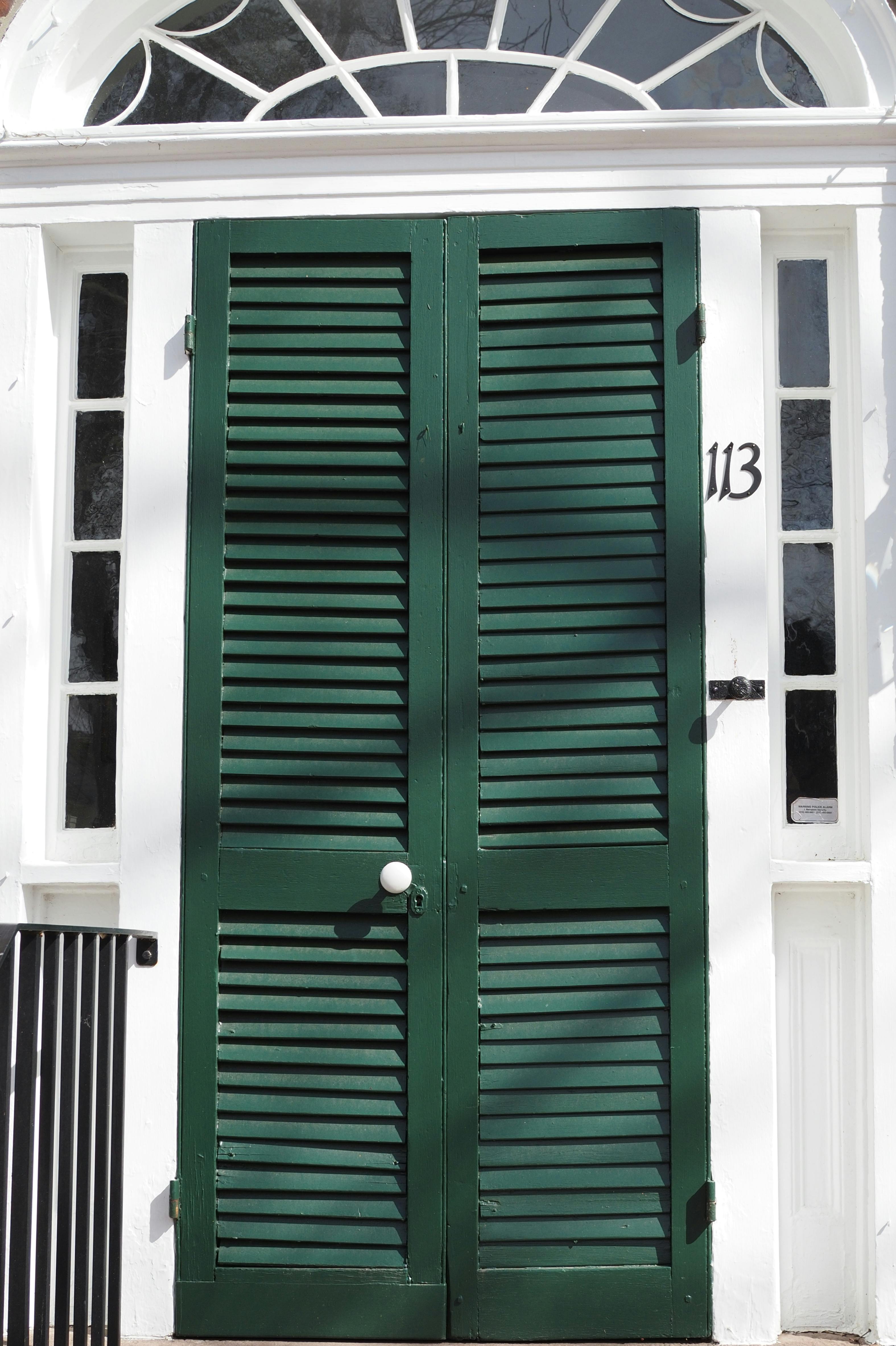 Green Louvered Double Door with Transom Arch · Free Stock Photo