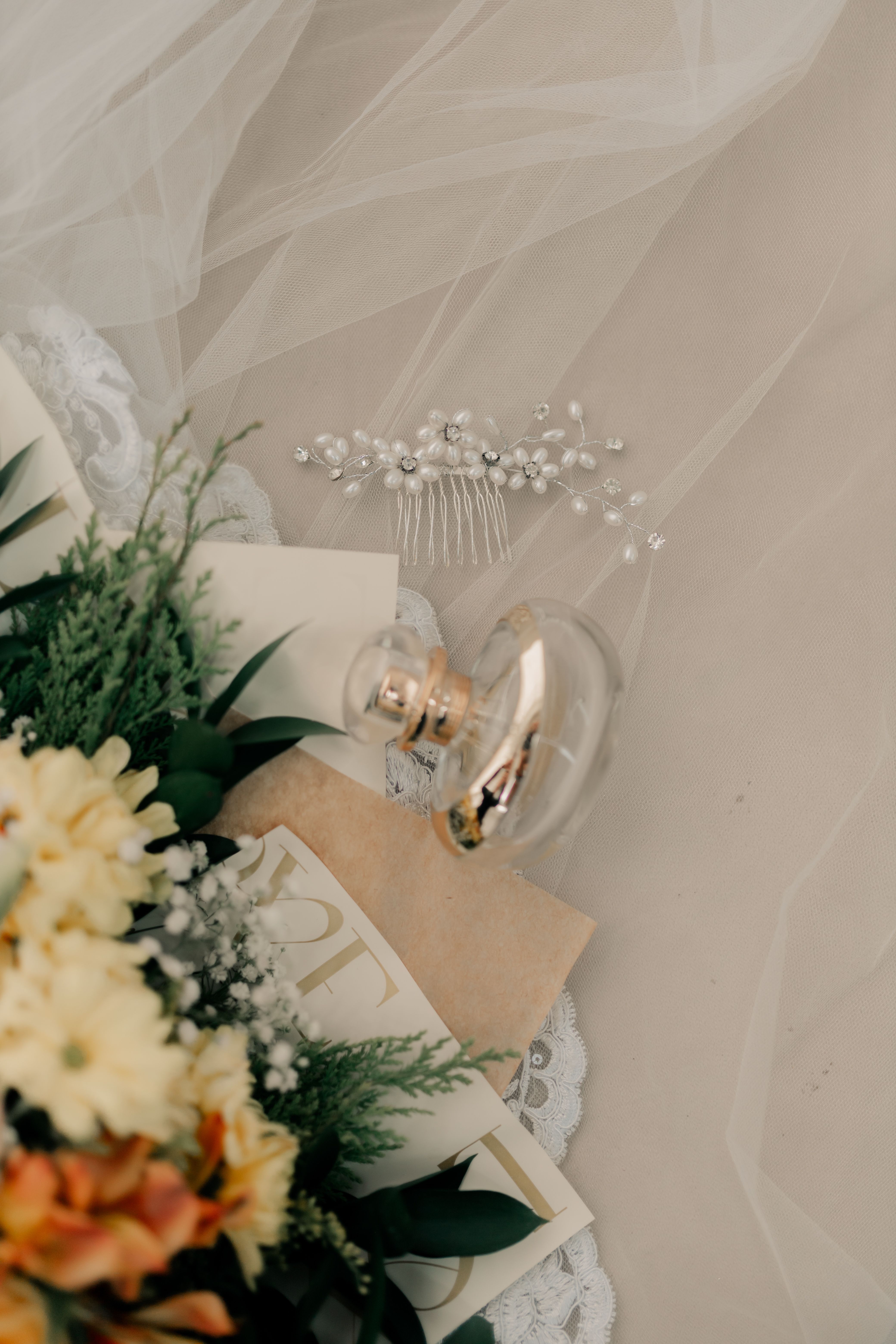 Elegant Flat Lay of Bridal Accessories and Flowers · Free Stock Photo