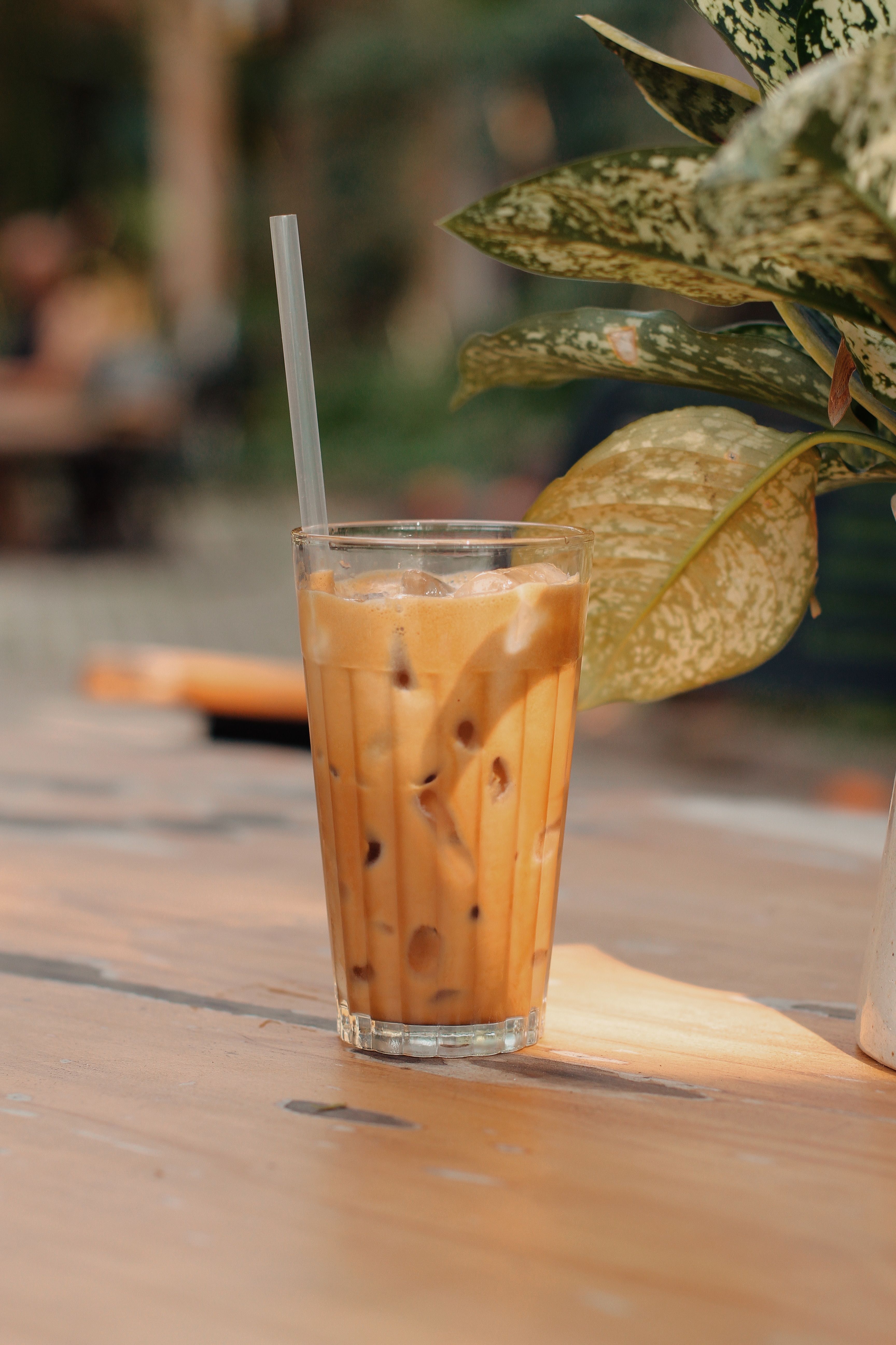 Iced Coffee in Glass on Outdoor Table · Free Stock Photo