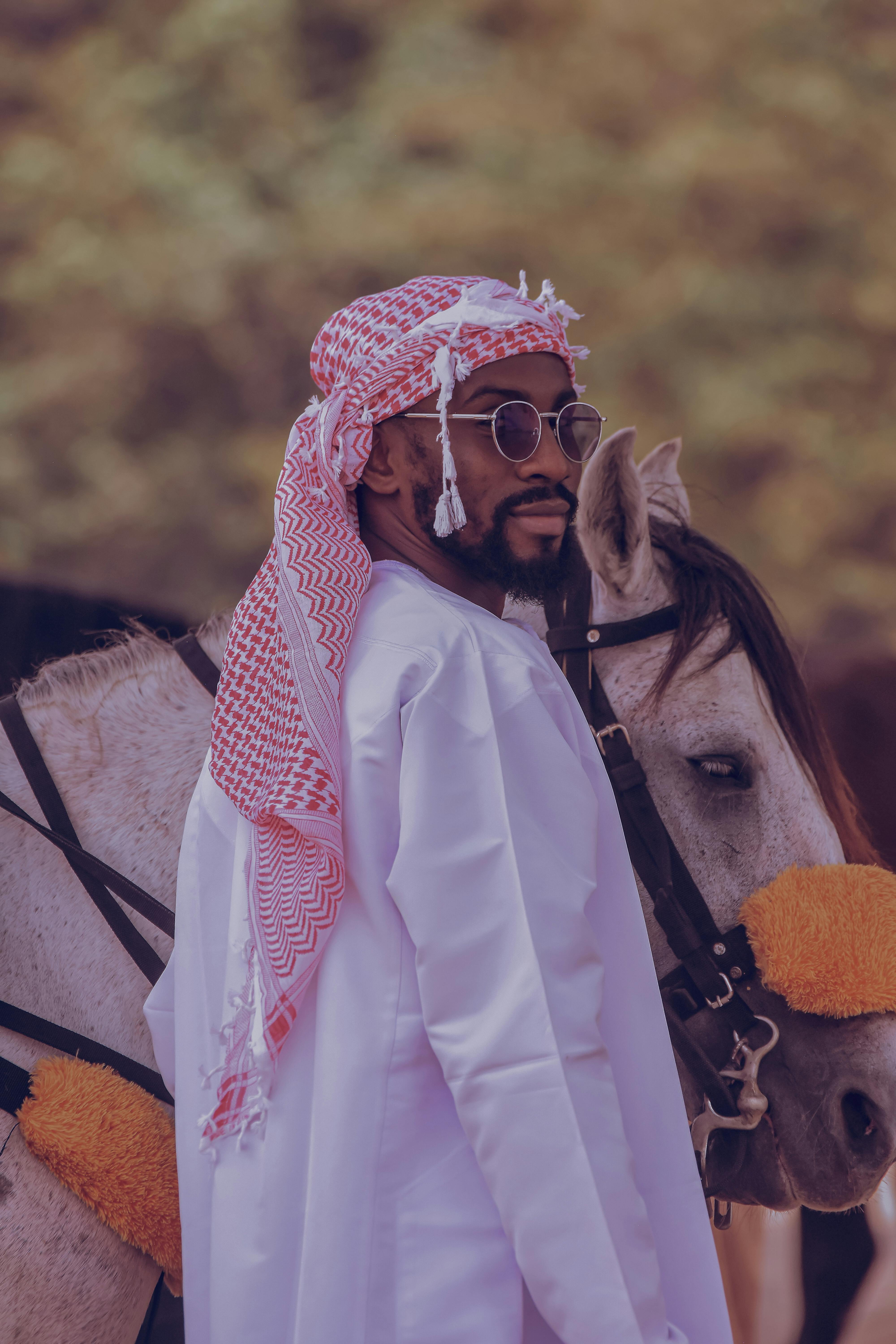 Middle Eastern Man in Traditional Attire Indoors · Free Stock Photo