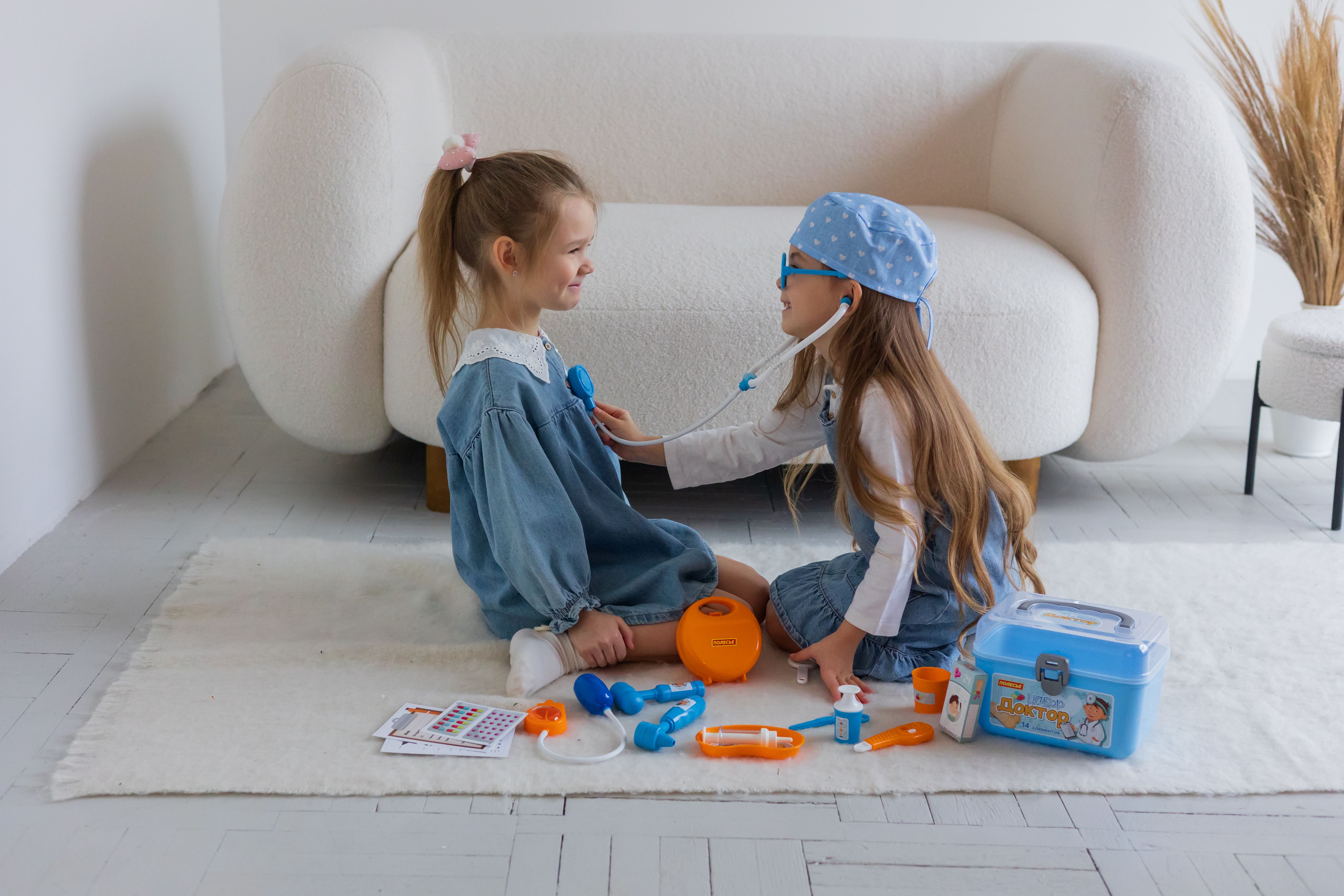 Children Playing Doctor with Toy Medical Kit · Free Stock Photo