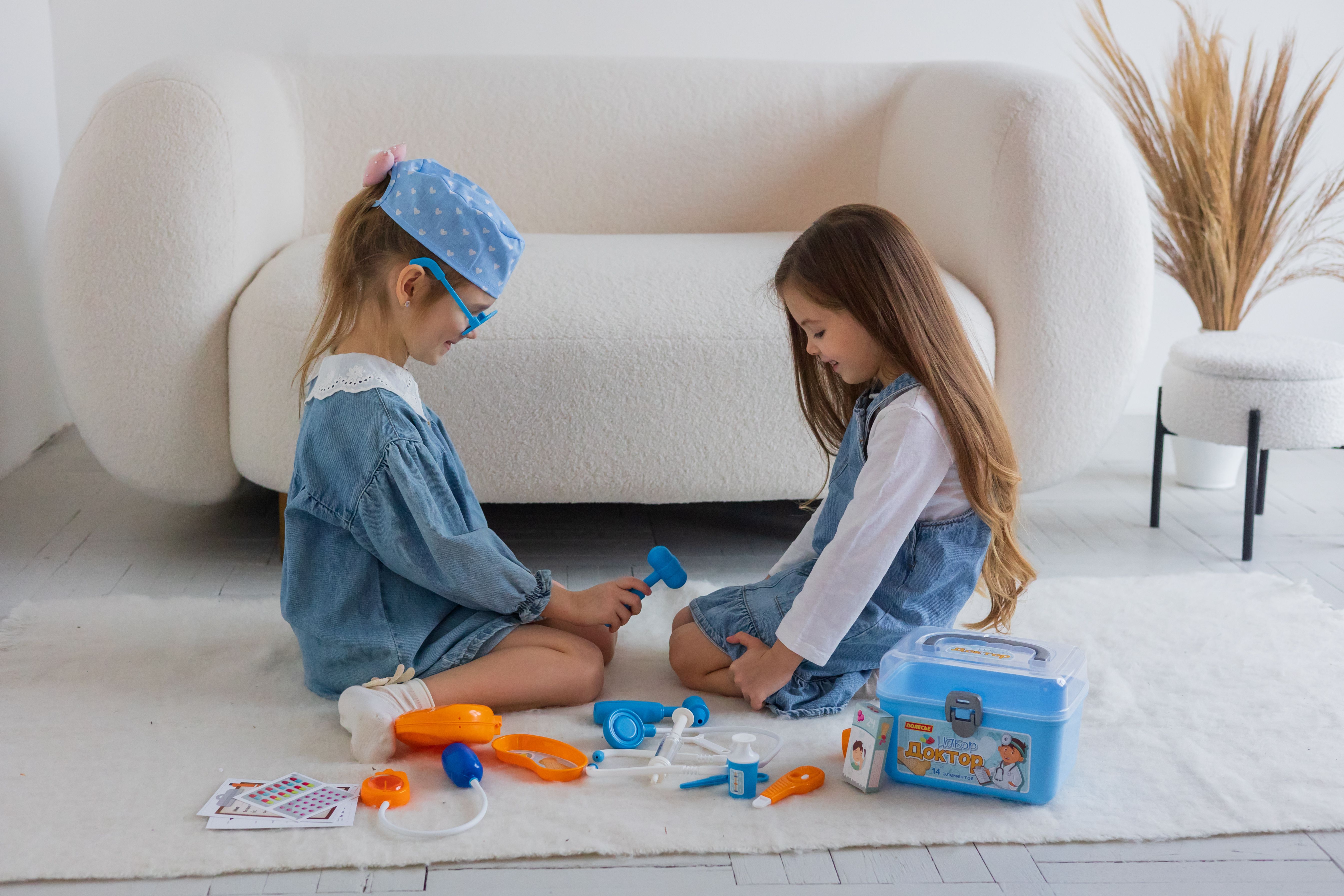 Children Playing Doctor with Toy Medical Kit · Free Stock Photo
