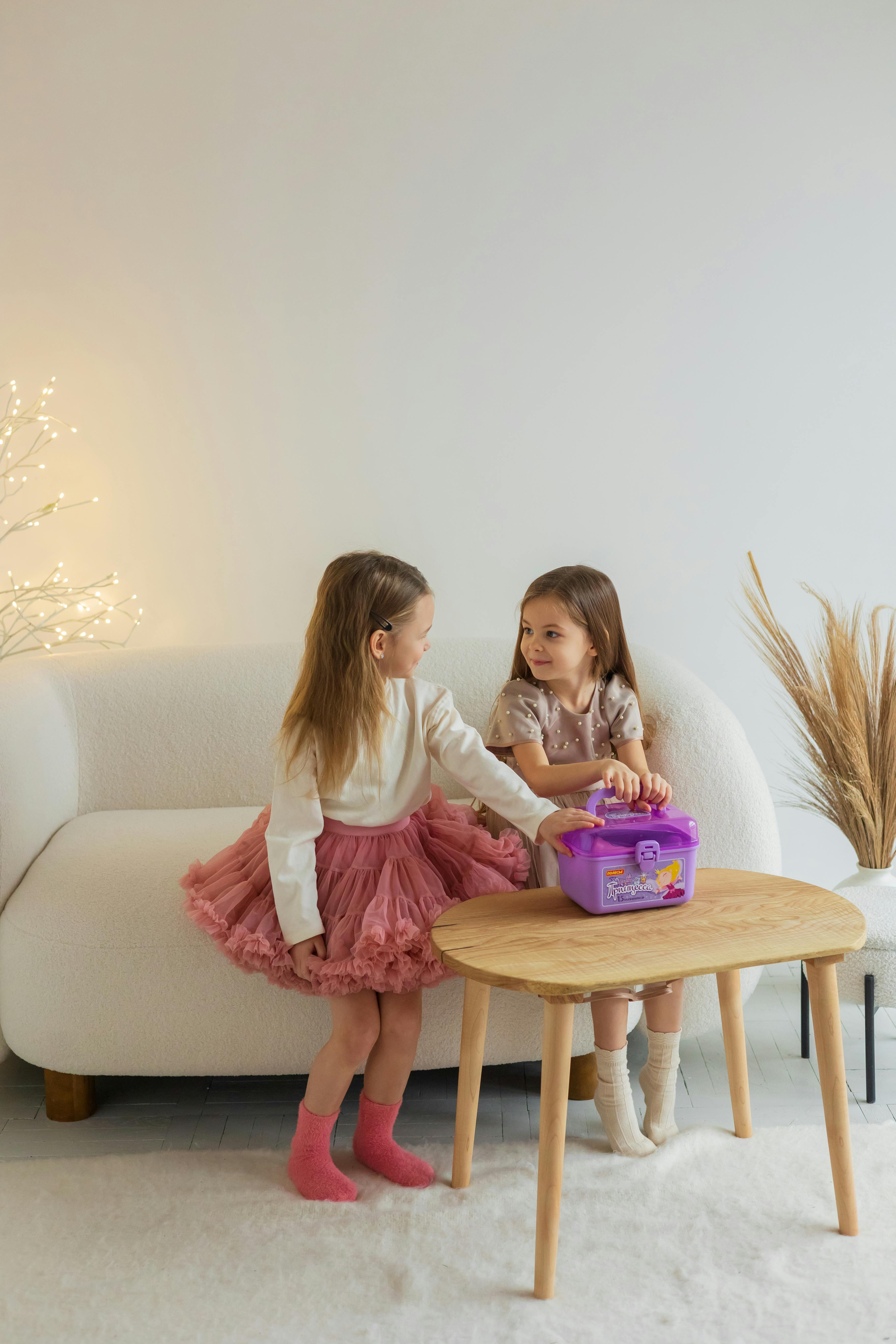 Charming Indoor Playtime with Two Little Girls · Free Stock Photo