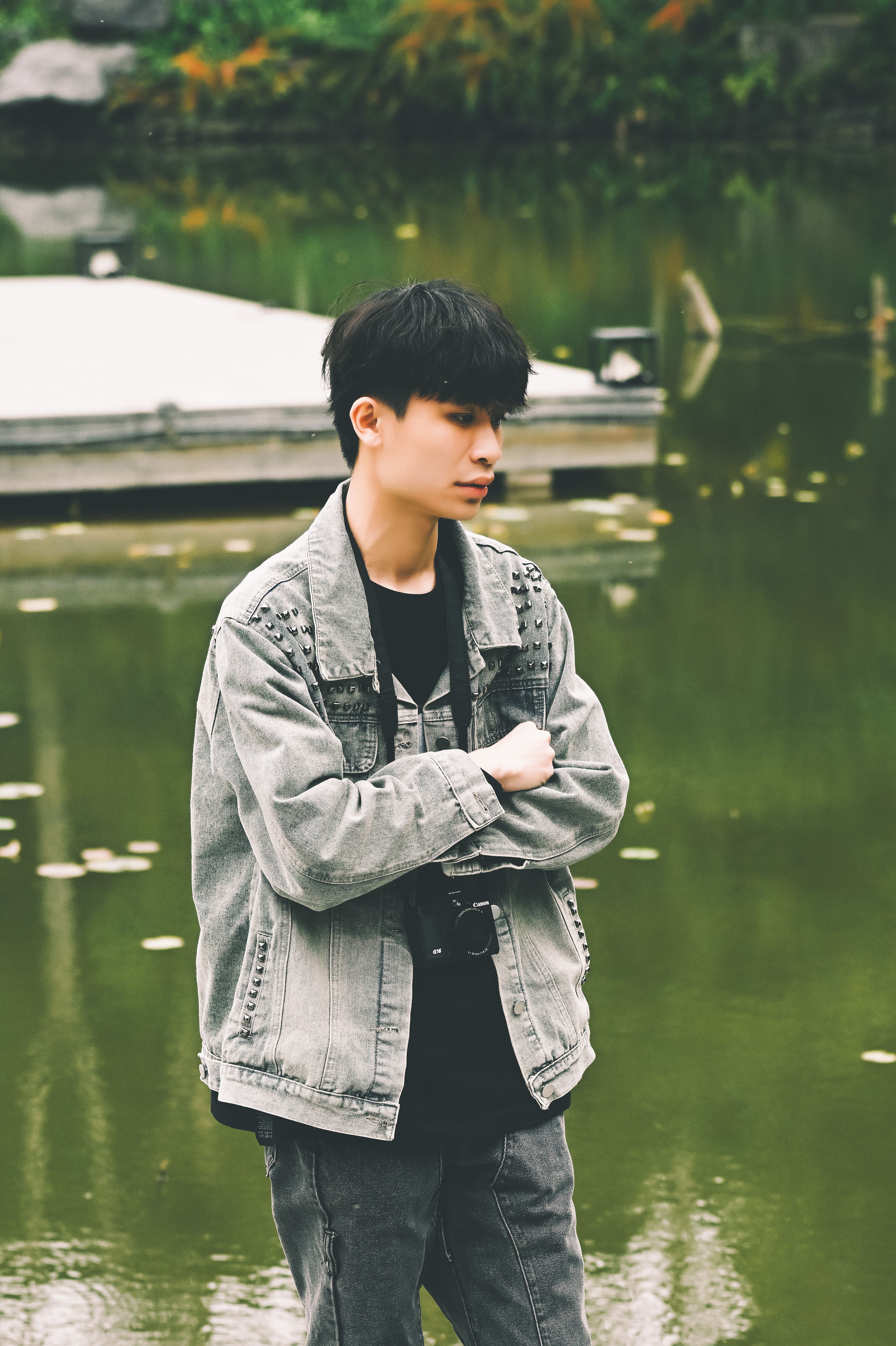 Young Photographer Capturing Outdoor Scene · Free Stock Photo