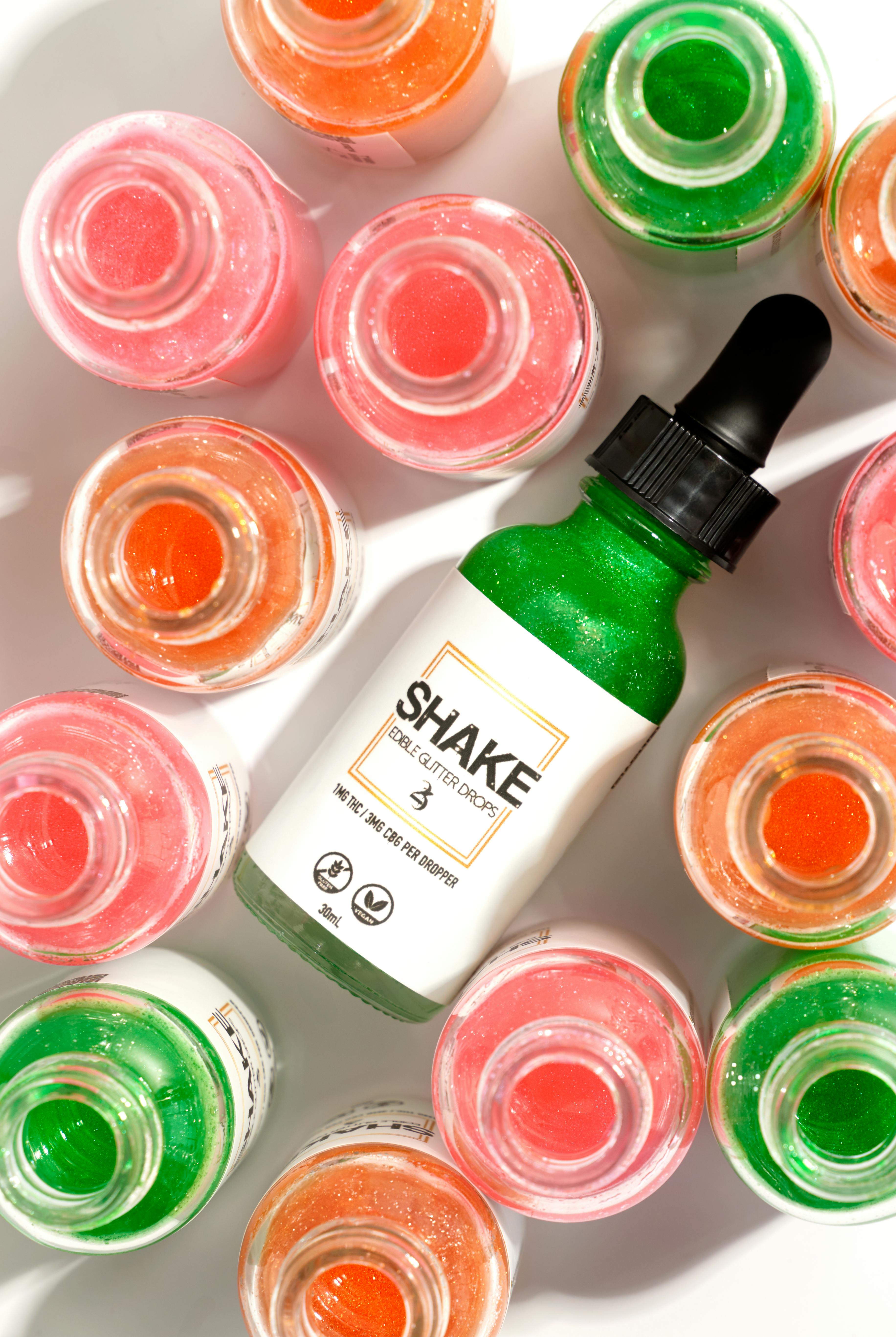 Colorful Bottles of Liquid Shake Vitamin Dropper · Free Stock Photo