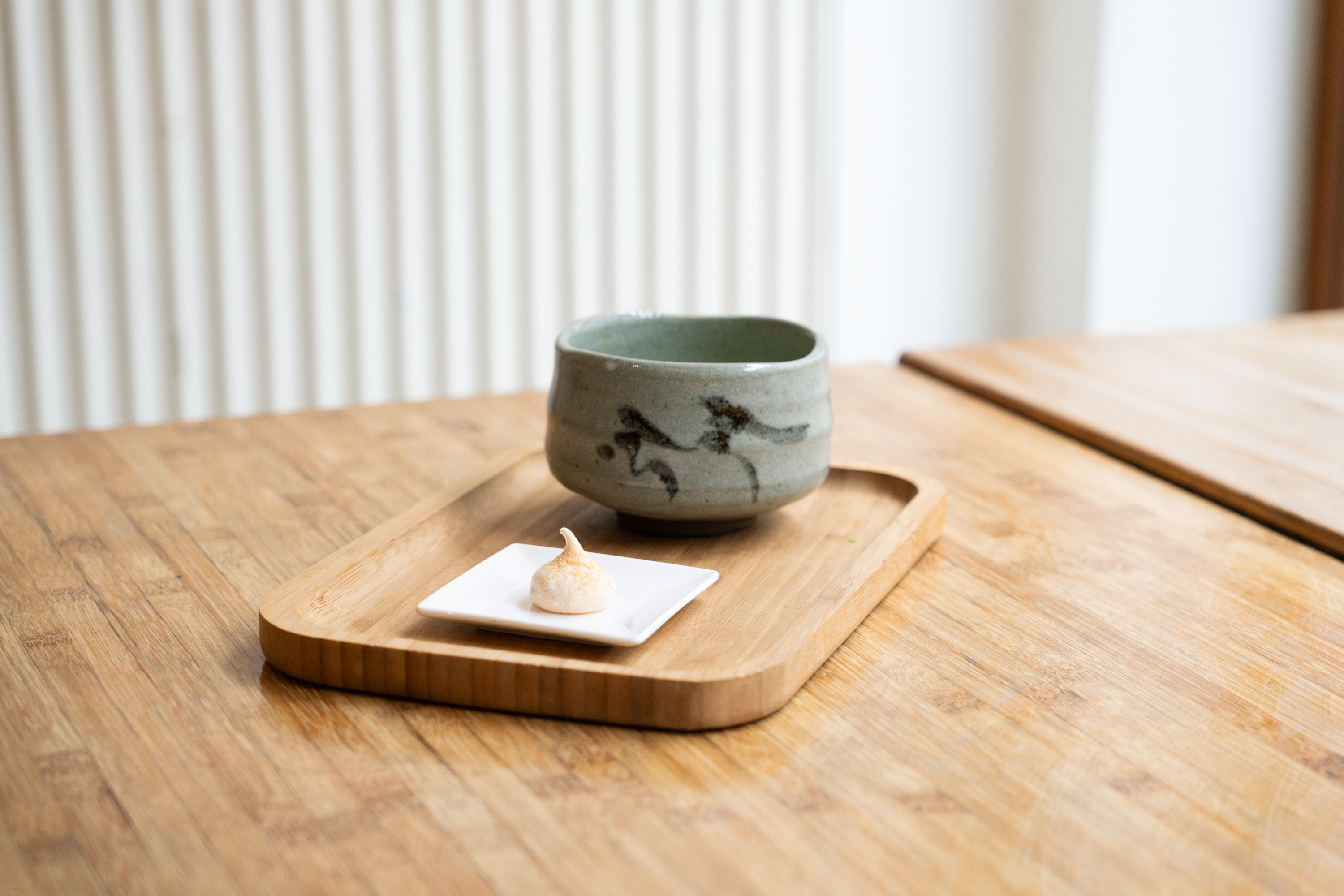 Minimalist Ceramic Tea Cup with Meringue · Free Stock Photo