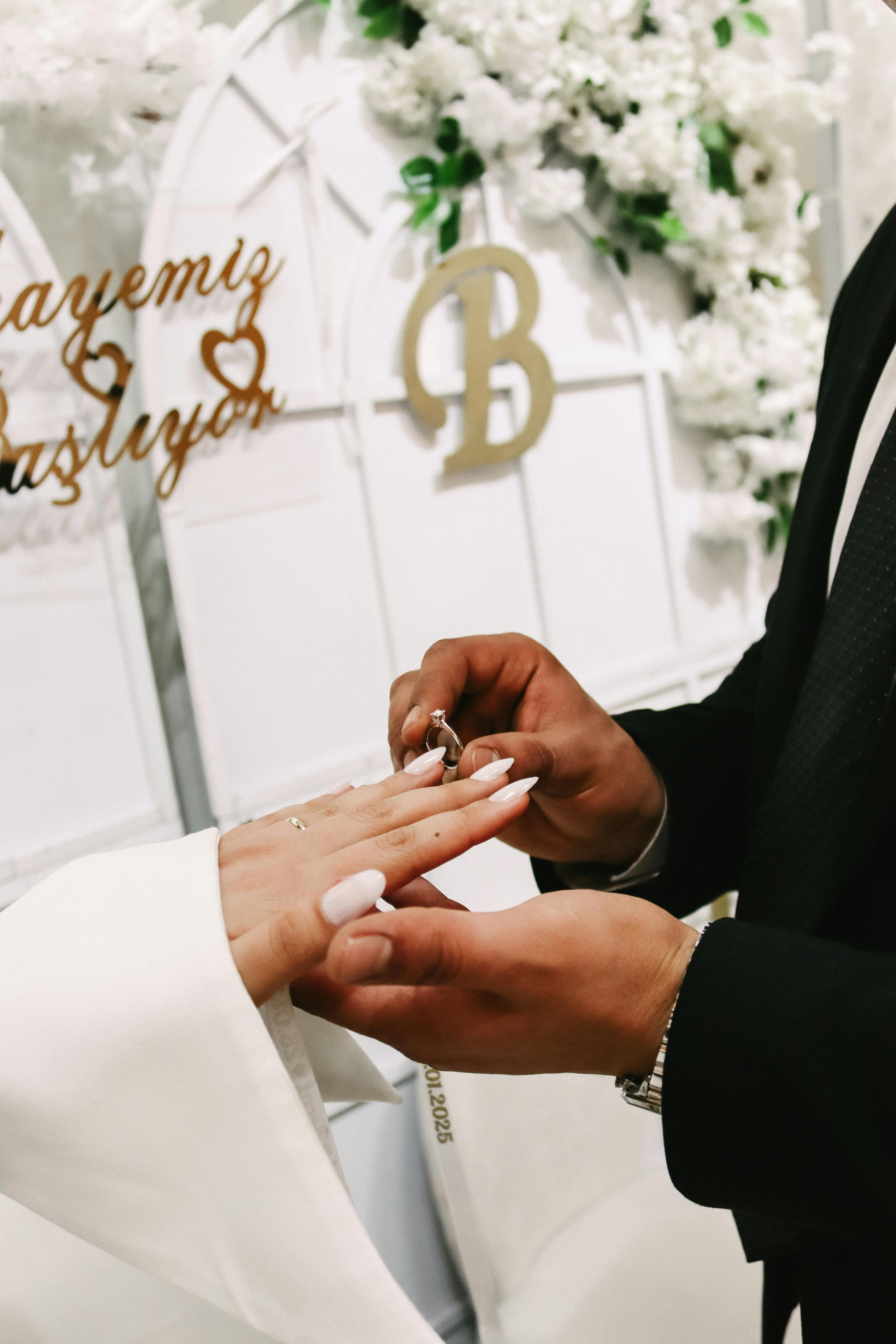 Elegant Wedding Ring Exchange Ceremony Moment · Free Stock Photo