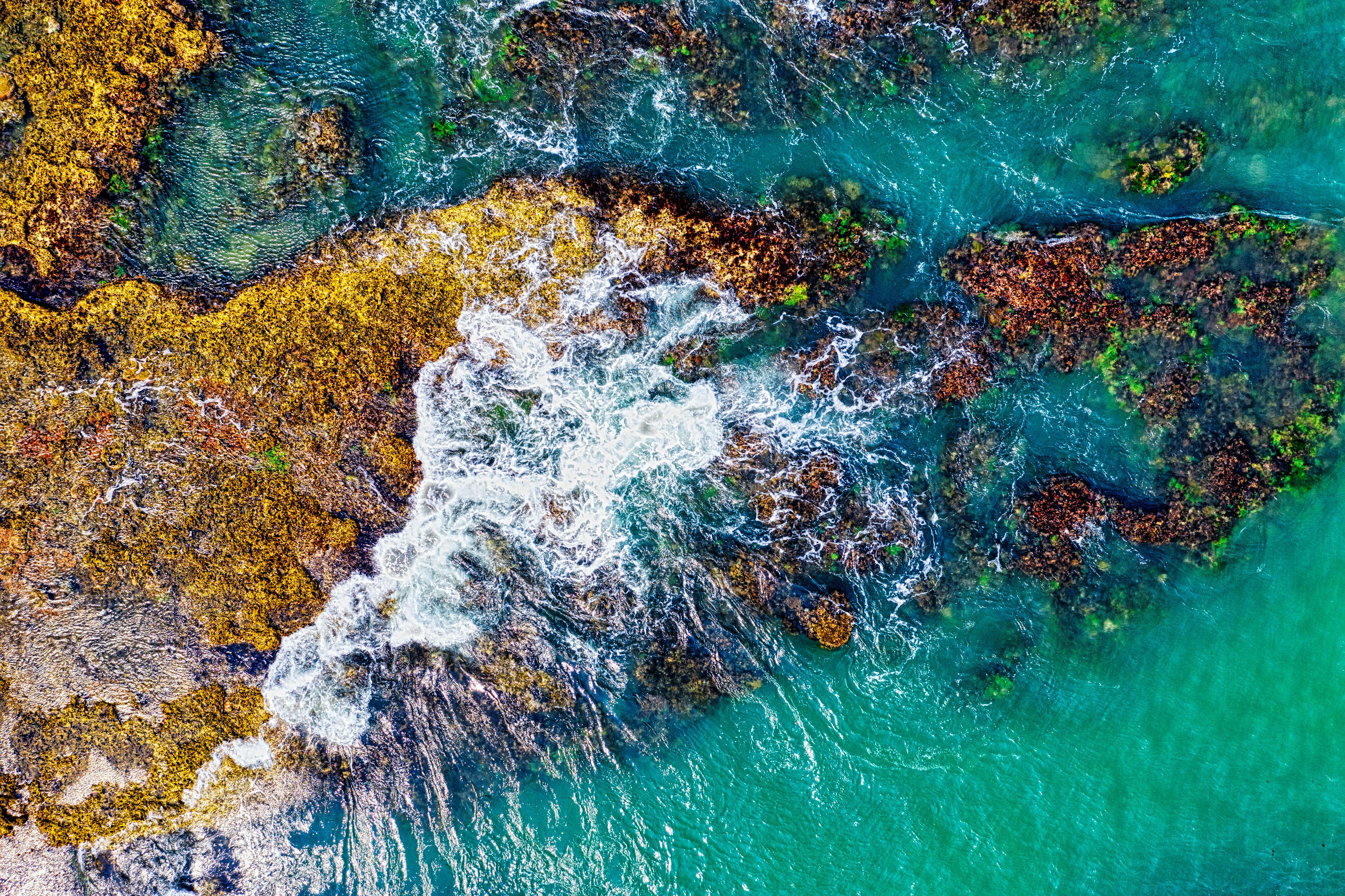 Top View Photo of Seawater on Rock Formation · Free Stock Photo