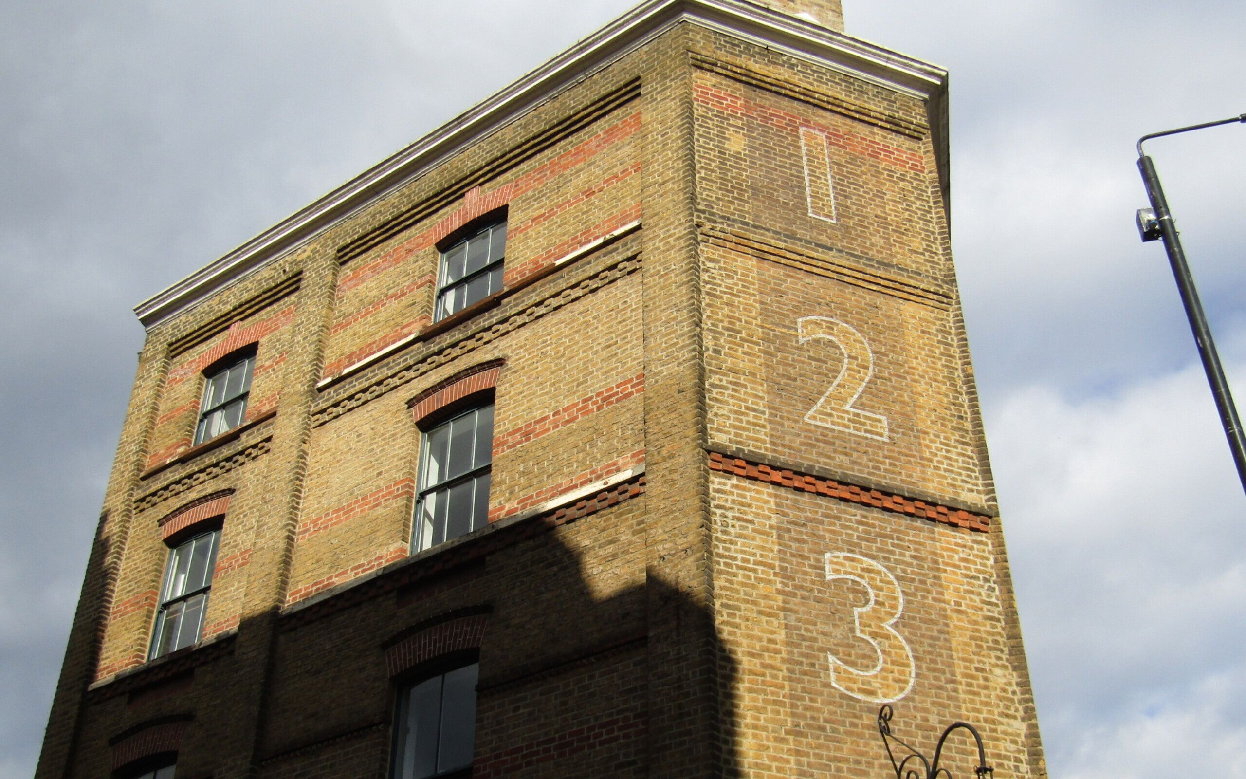 Classic London Building with Numbered Bricks · Free Stock Photo